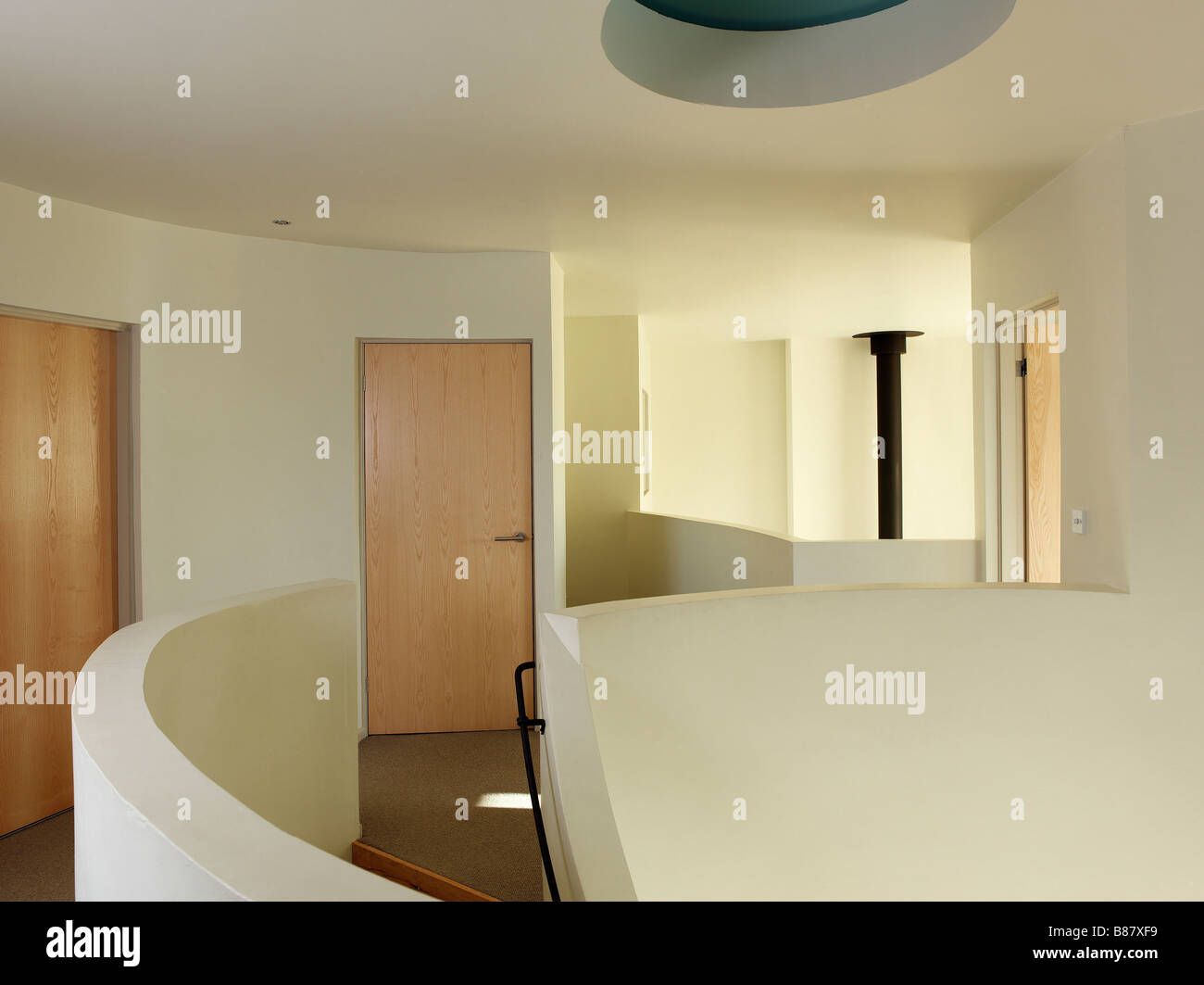 contemporary first floor white hallway Stock Photo - Alamy