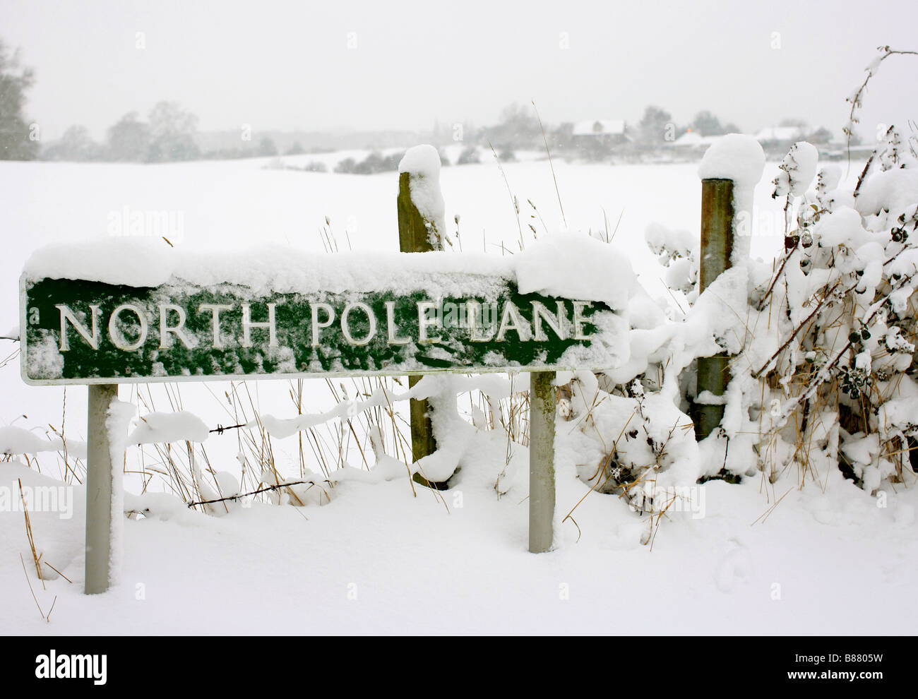 A snow covered road sign 'North Pole Lane' in Keston, Greater London ...