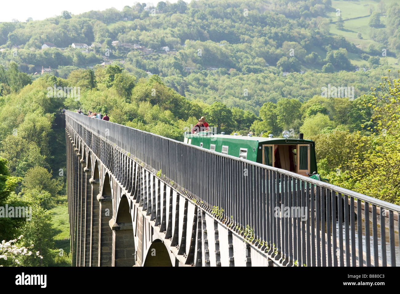 Narrow boat crossing the Pontcysyllte viaduct on the Llangollen Canal ...