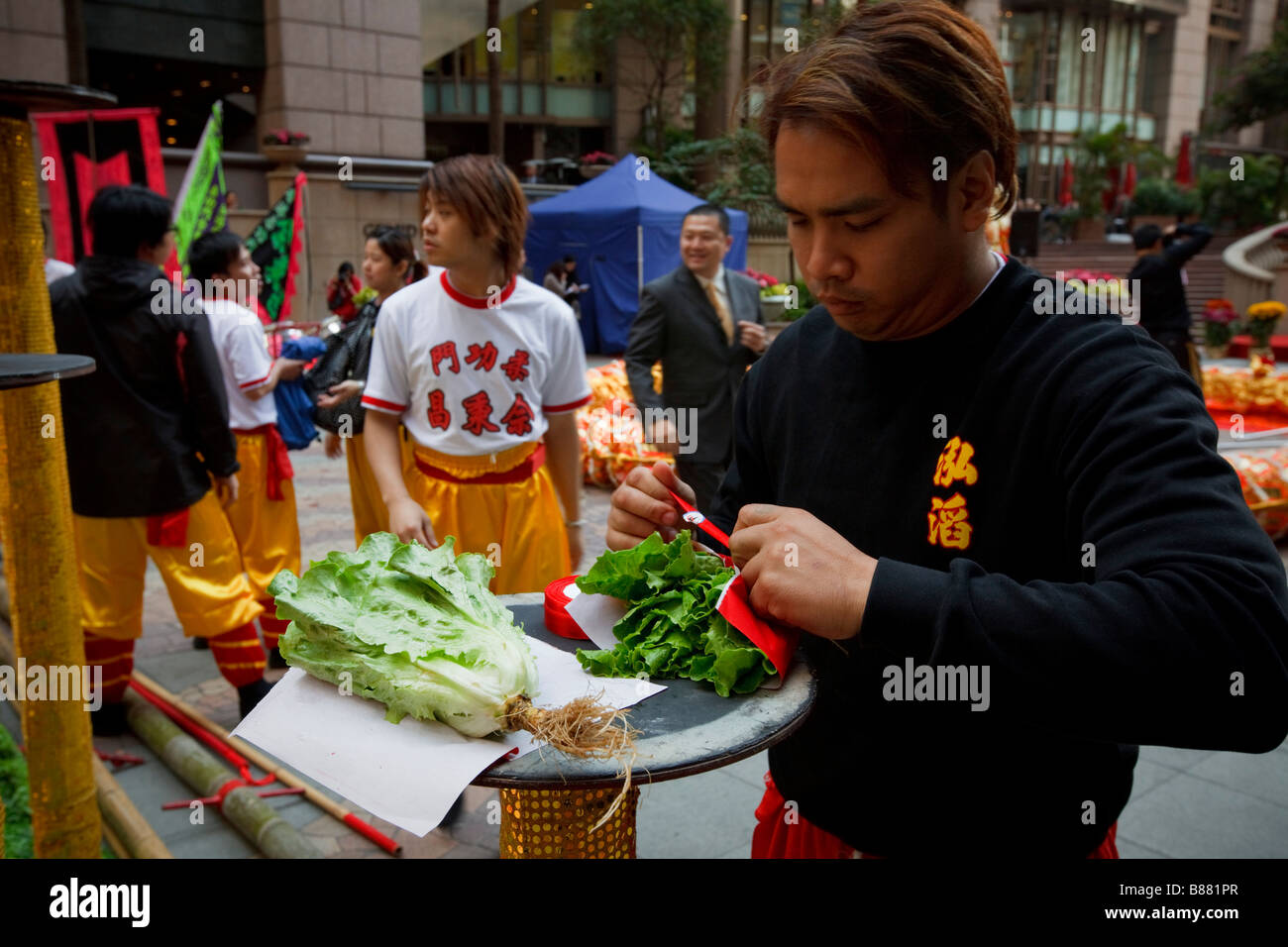Preparing choi chang for a traditional Chinese Lion Dance to celebrate ...