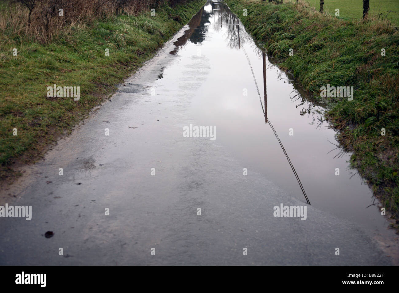 Flooded country road Stock Photo - Alamy