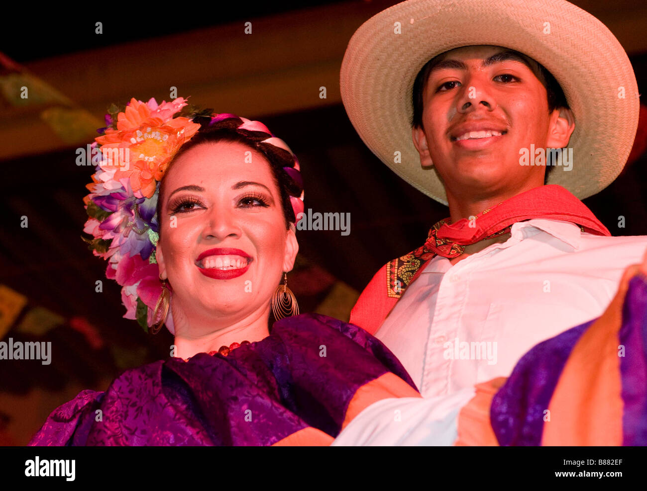 MEXICO SINOLA STATE MAZATLAN Smiling Folk Dancers performing on stage ...