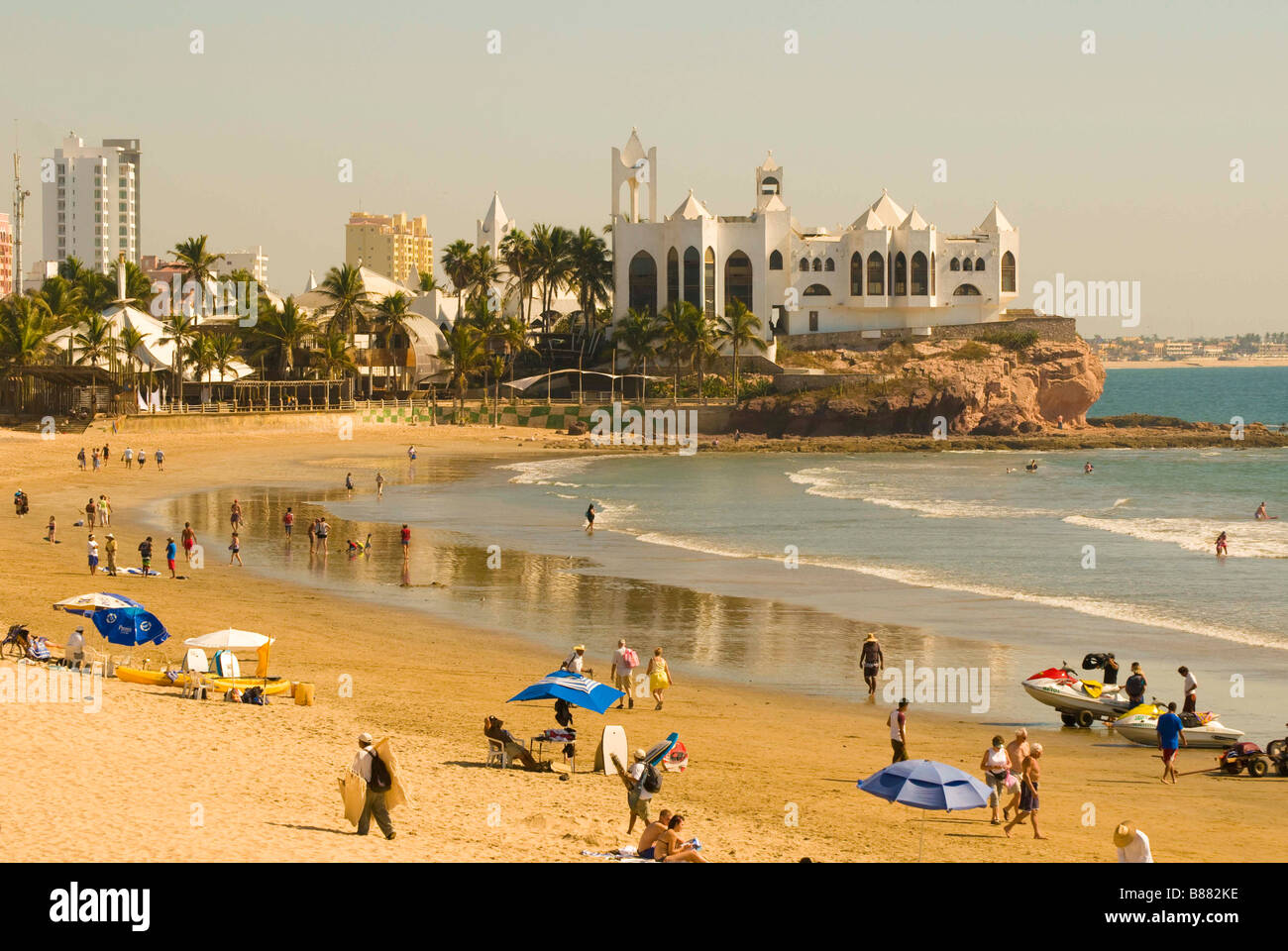 MEXICO SINOLA STATE MAZATLAN People enjoying beach activities with ...