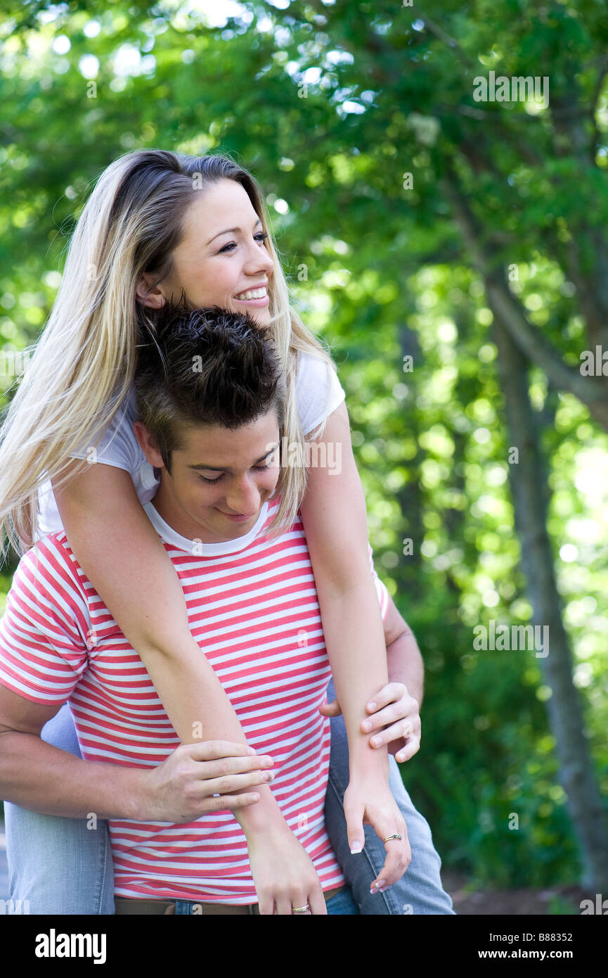 Young couple playing around outside hi-res stock photography and images ...