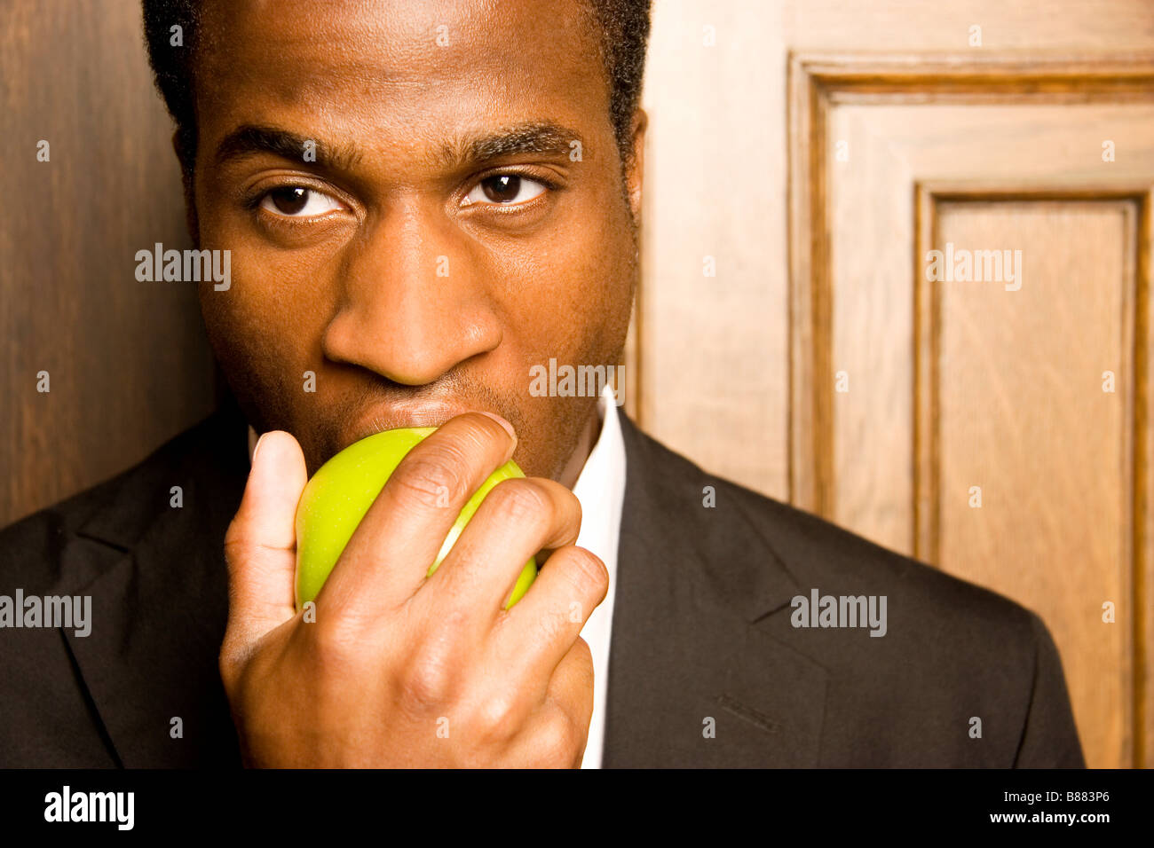 Man eating an apple Stock Photo - Alamy