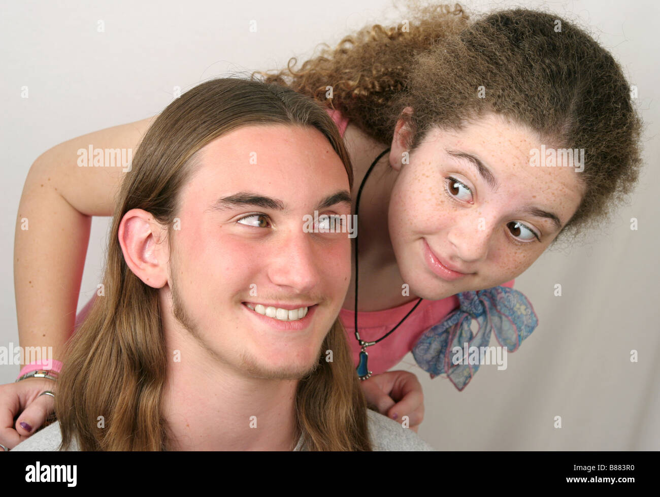 teen couple flirting with eachother Stock Photo - Alamy