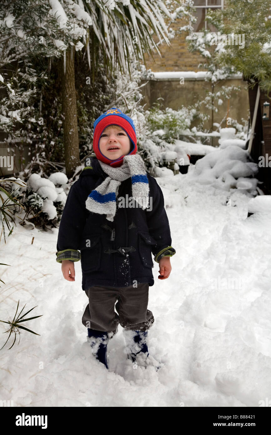 Boy in snow Stock Photo - Alamy