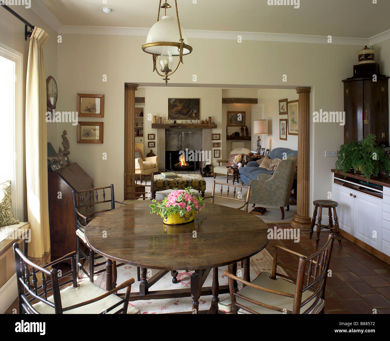 Dining room with round dining table and views through to the living ...