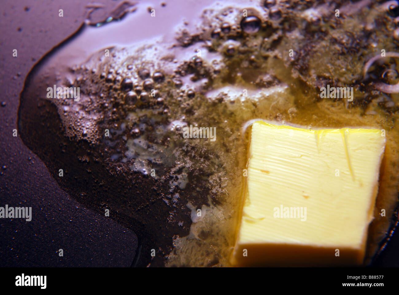 Melting butter in pan Stock Photo - Alamy