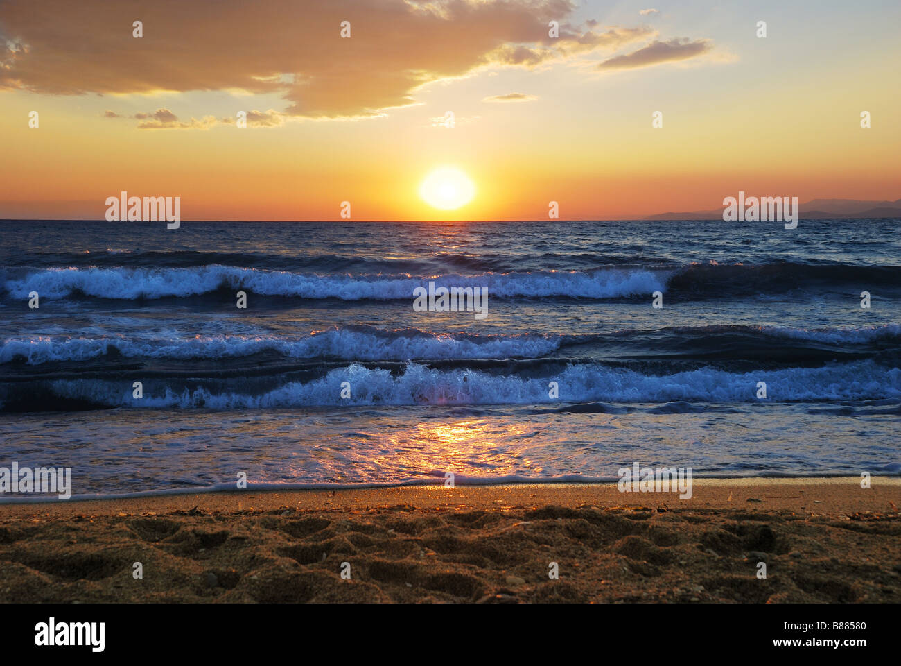 Ocean waves bright sunset hi-res stock photography and images - Alamy