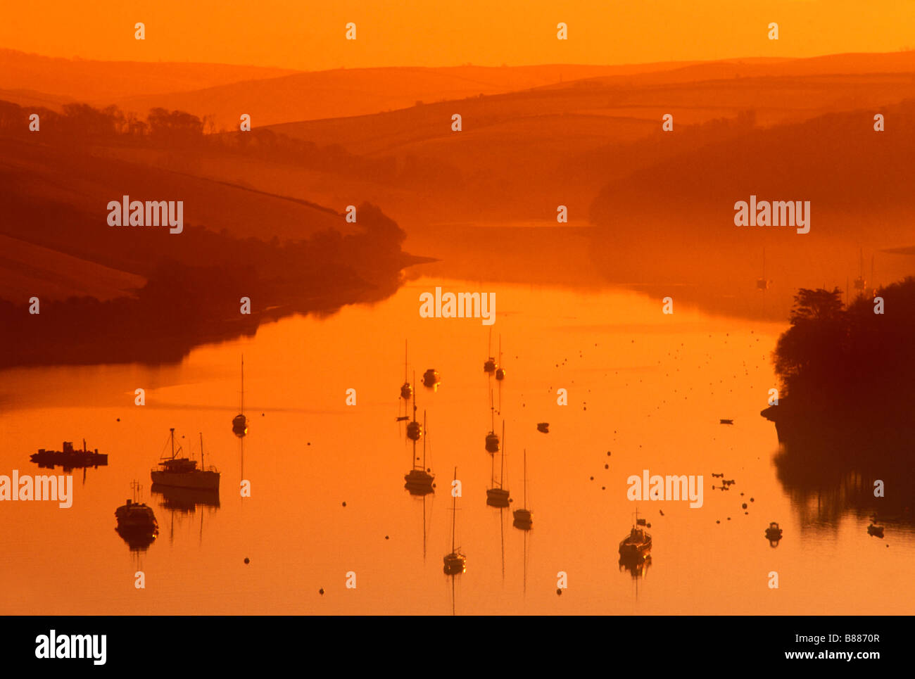 A misty sunrise/sunset over the Salcombe Estuary Devon England UK Stock ...