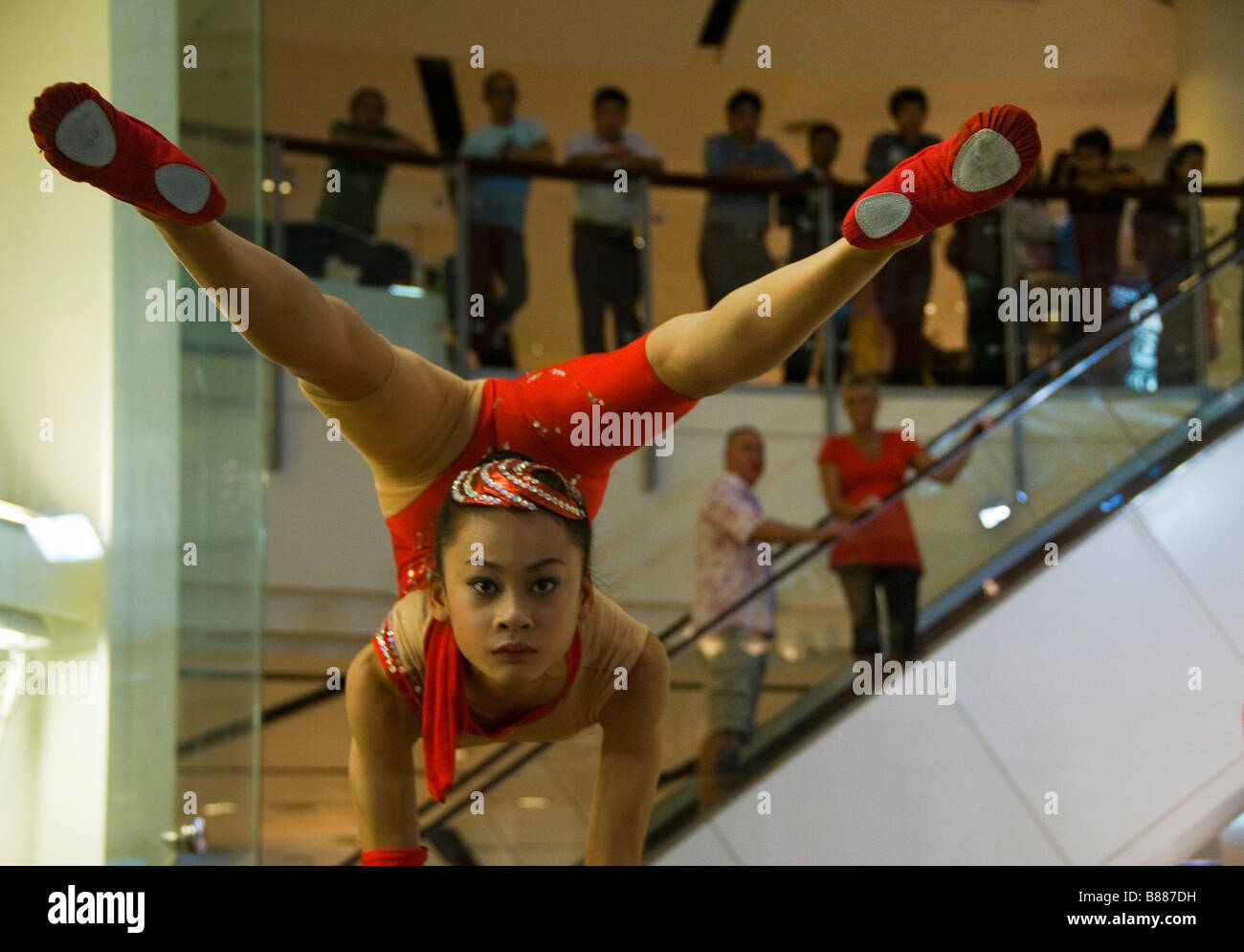 Chinese acrobat practicing for Chinese New Year show in Bangkok ...