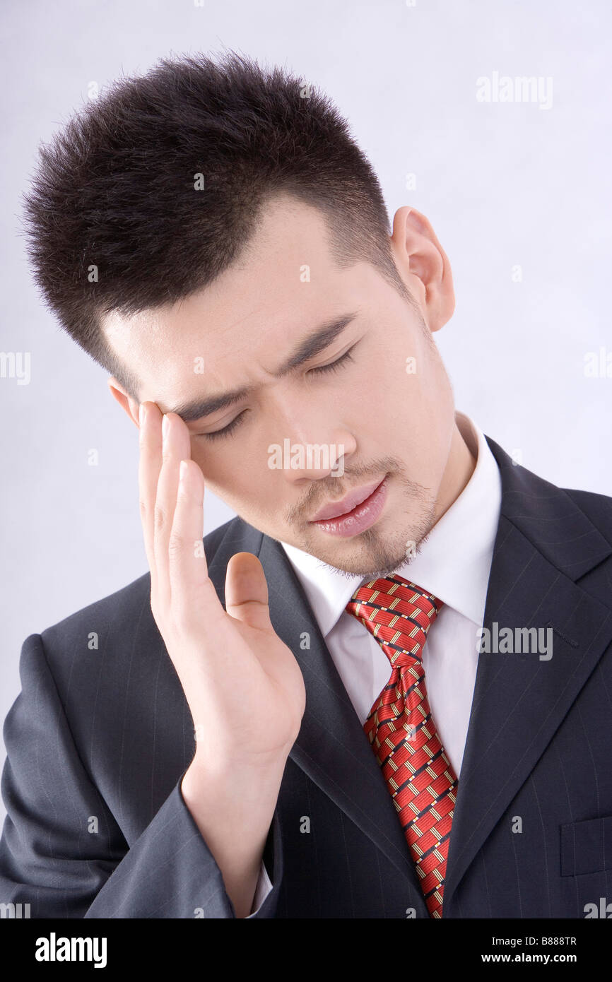 Thoughtful businessman closed eyes portrait Stock Photo - Alamy
