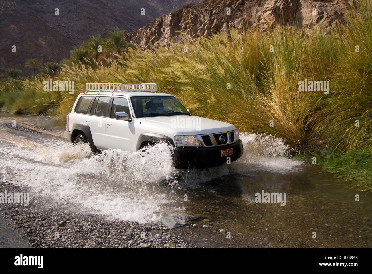 Offroad car in water near Muscat the capital of Oman Persian Gulf ...