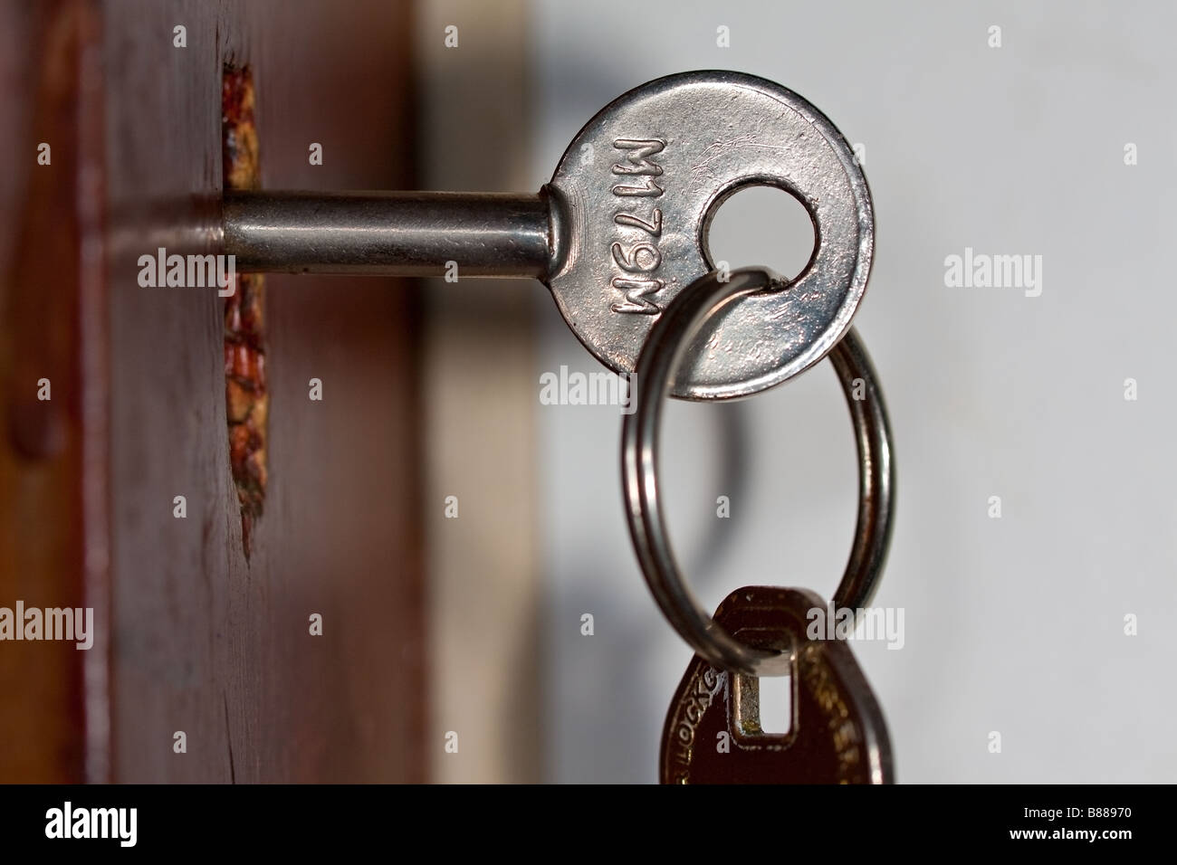 A key in a door lock Stock Photo - Alamy