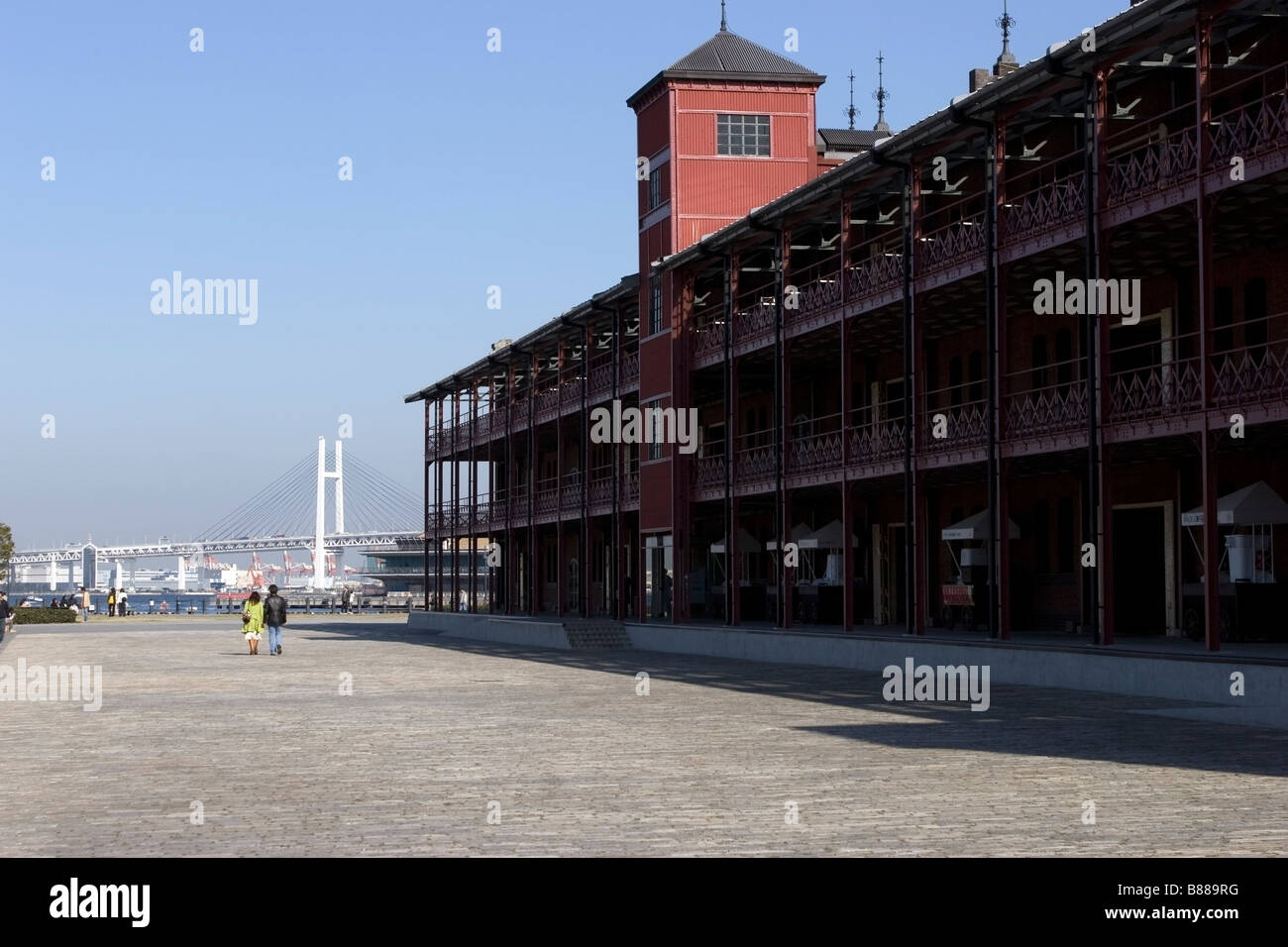 People walk by the Aka renga soko red brick warehouse in Yokohama Japan ...