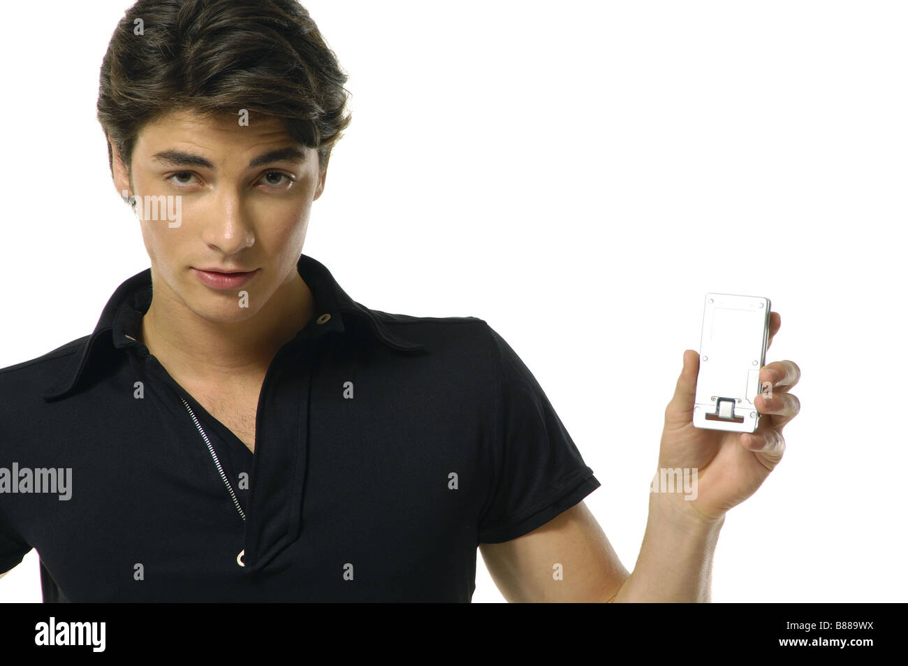 Portrait of a young man showing a mobile phone Stock Photo - Alamy