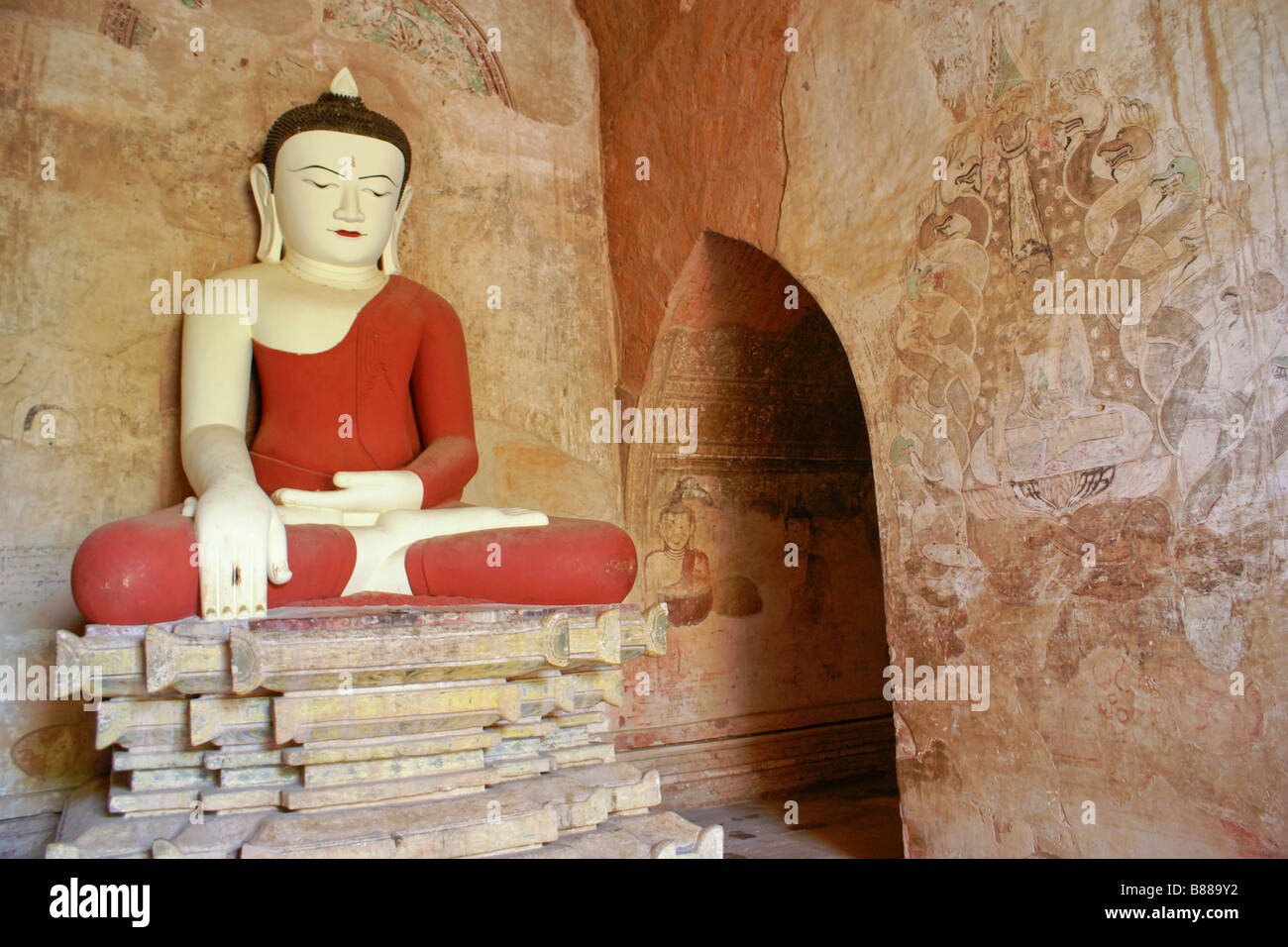 Buddha image in niche of temple, Bagan (Pagan), Myanmar (Burma Stock ...