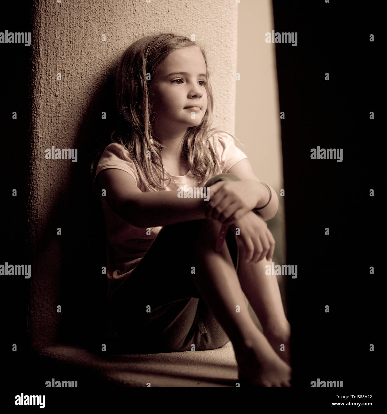 Sitting in a window Stock Photo - Alamy