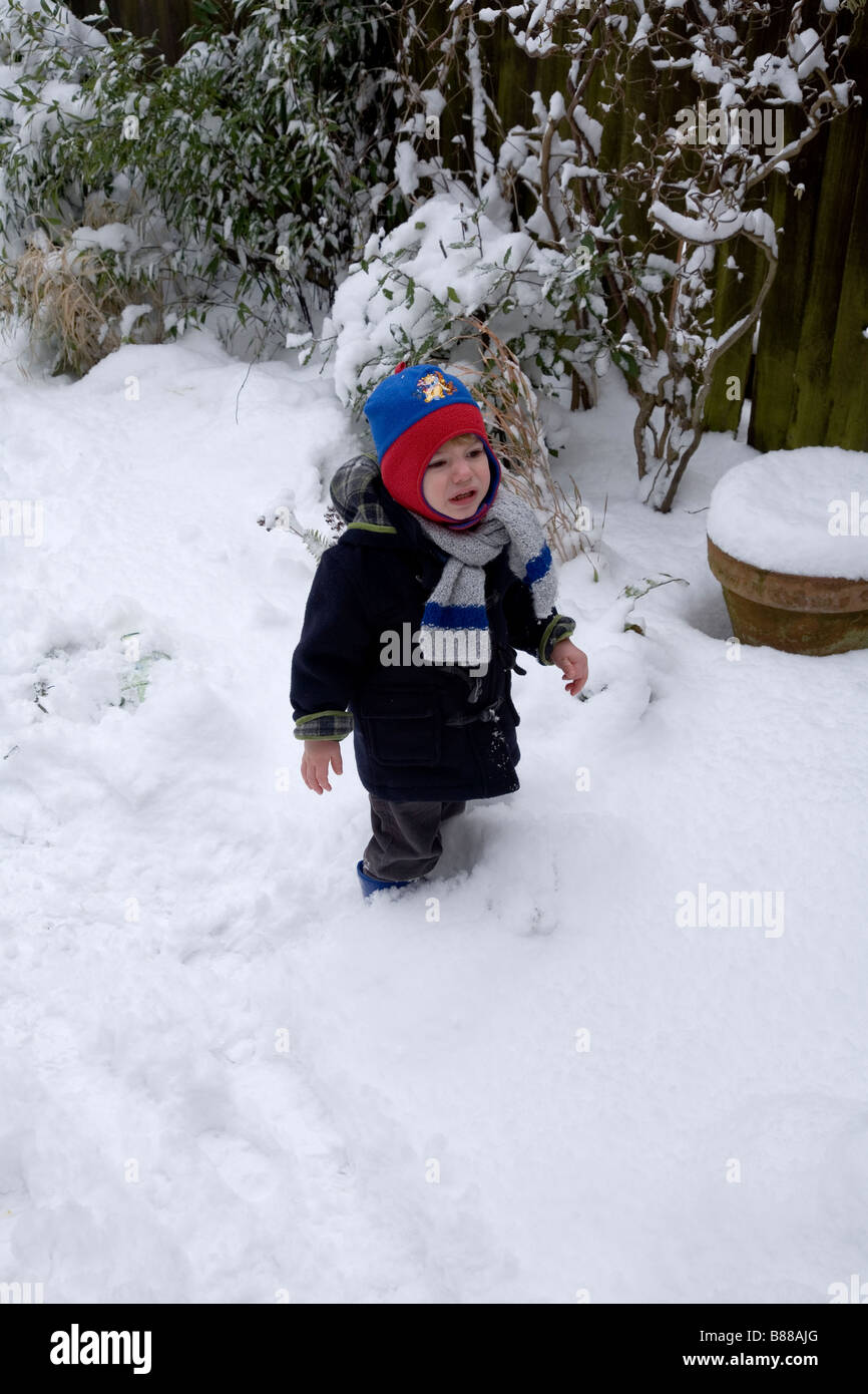 Boy in snow Stock Photo - Alamy