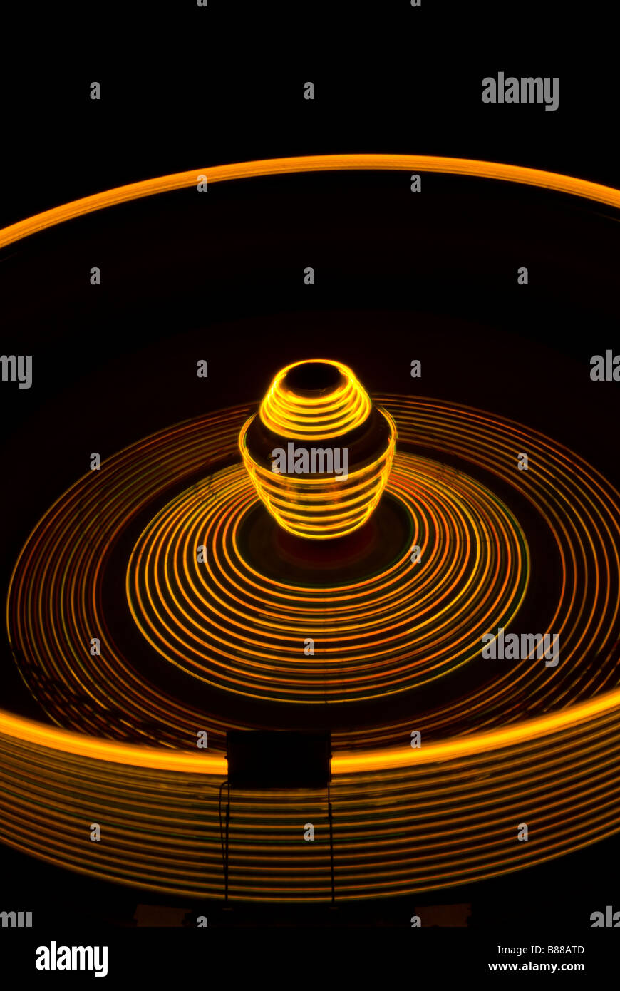 Abstract photograph of the light trails on a fun fair attraction Stock ...