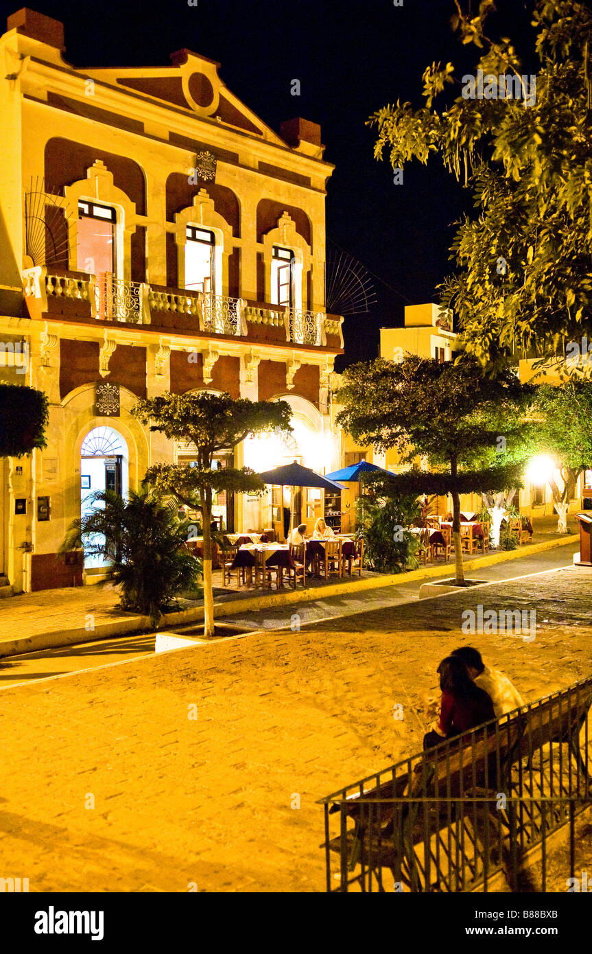 Hotel Machado and couple on park bench at Plaza Machado in old town ...