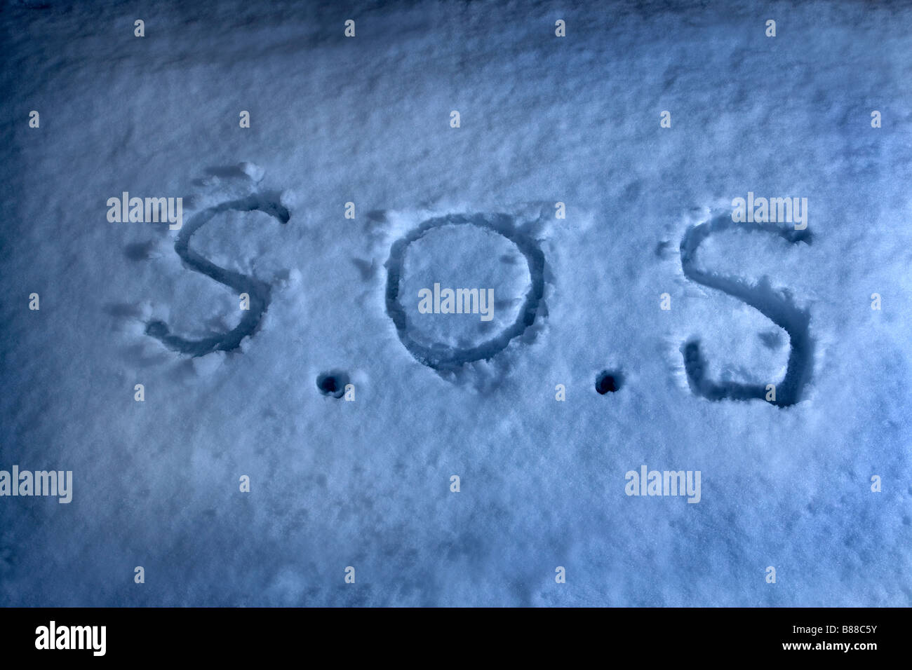 Words s.o.s written in the snow with finger Stock Photo - Alamy