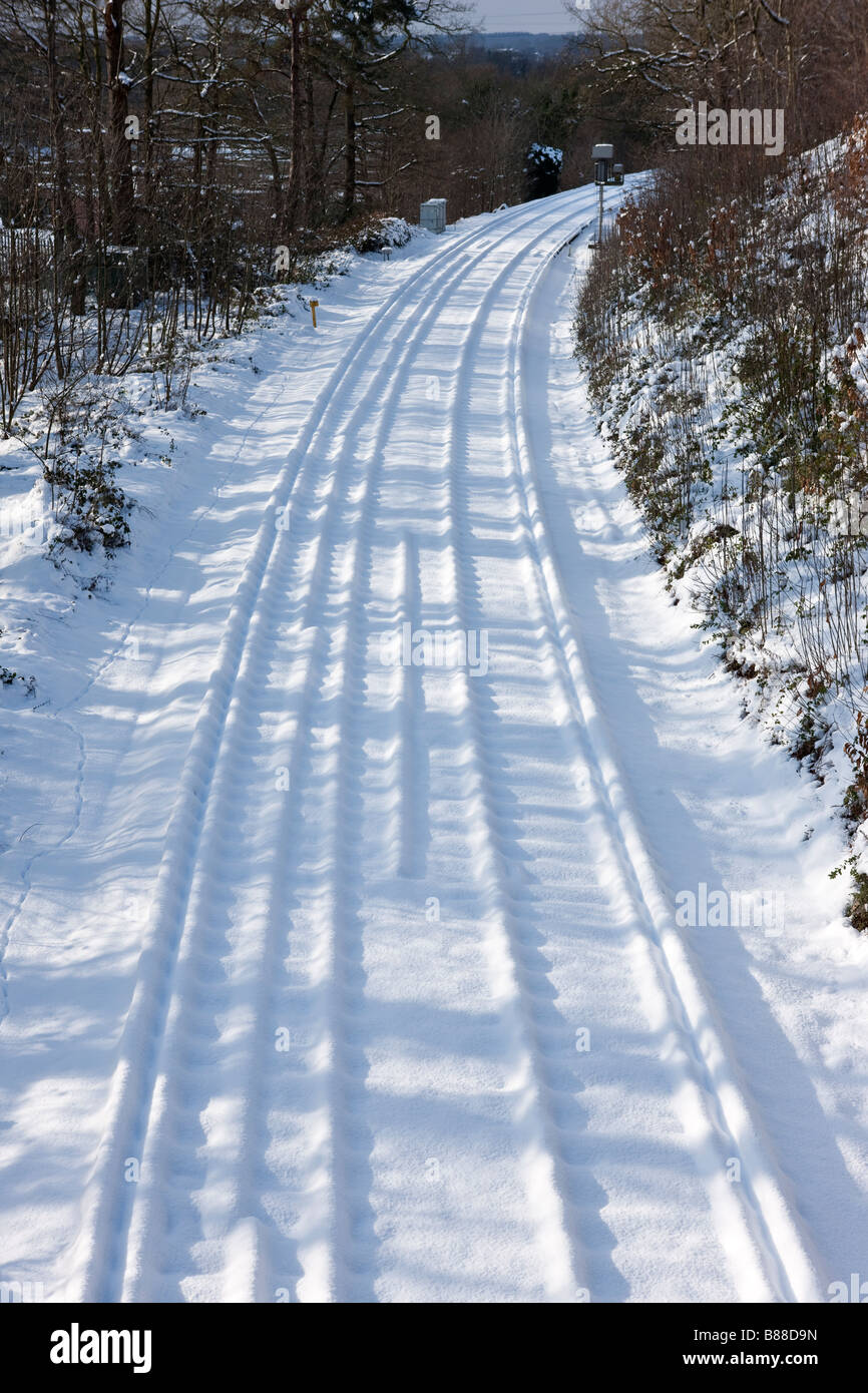 Snow covered railway tracks Stock Photo - Alamy