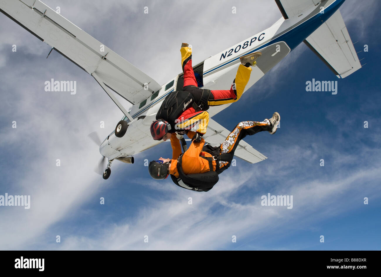 Skydivers are jumping out of a plane hi-res stock photography and ...