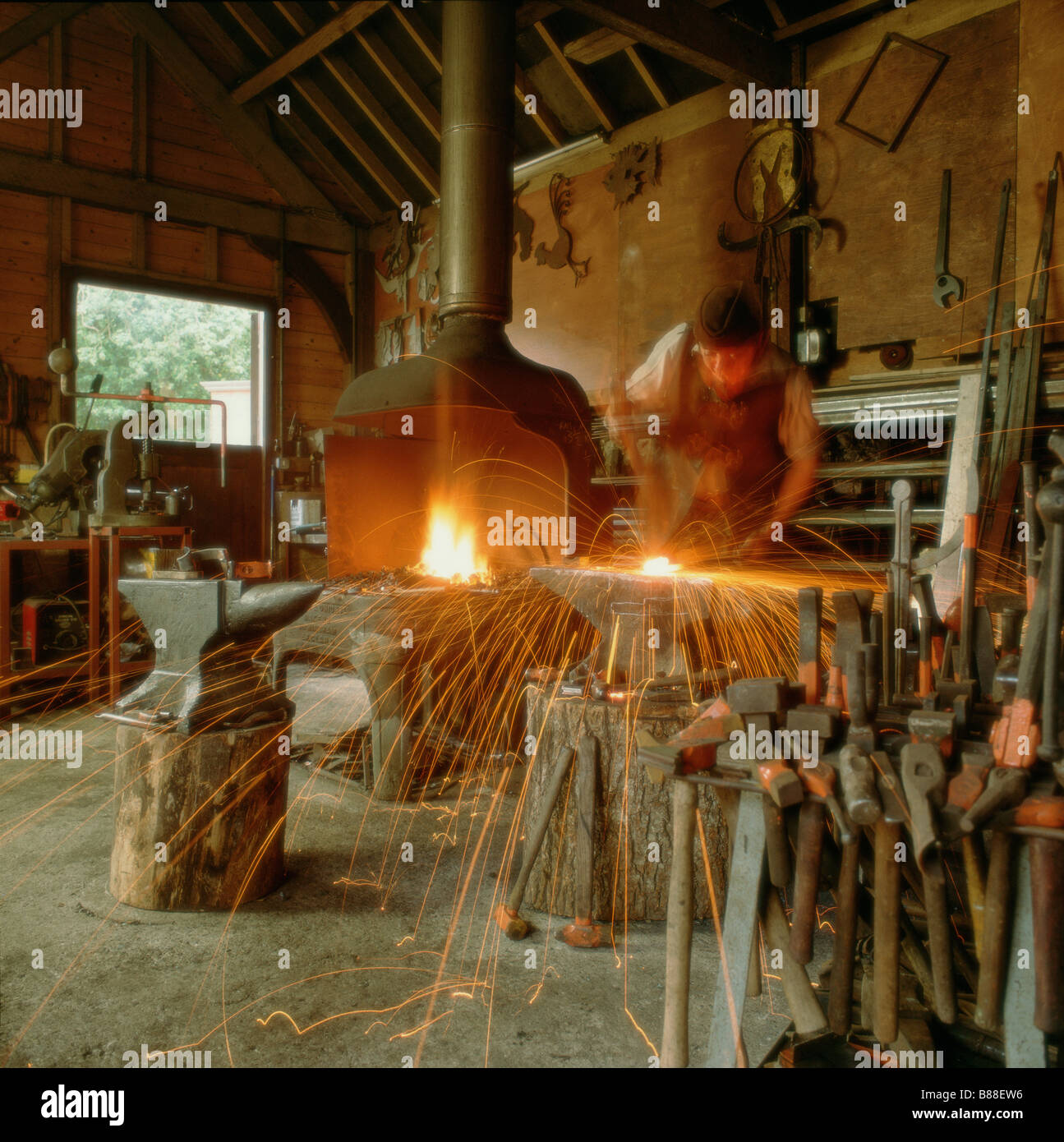 Blacksmith at work Stock Photo - Alamy