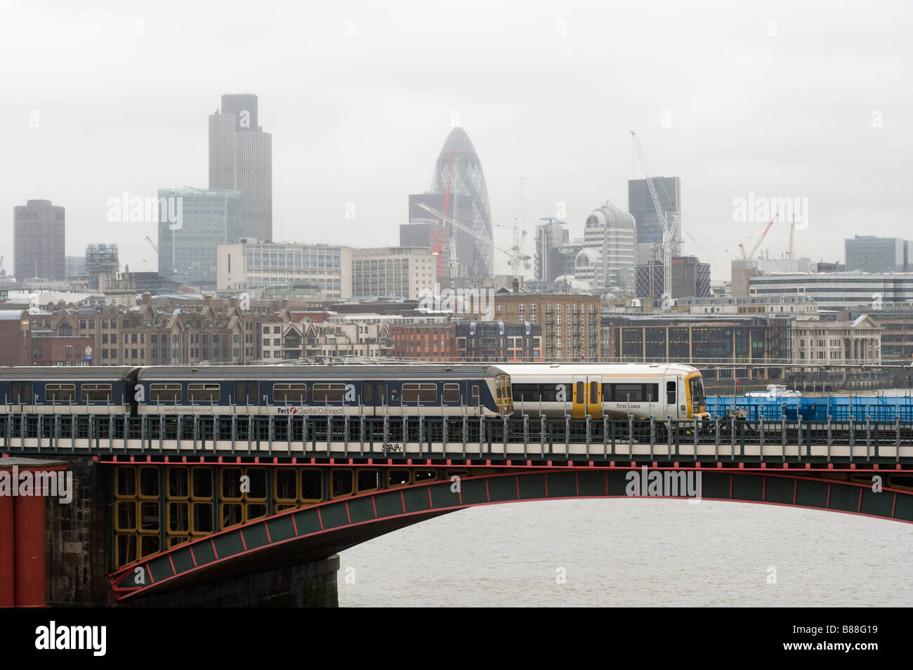 First Capital Connect and South Eastern trains passing over the railway ...