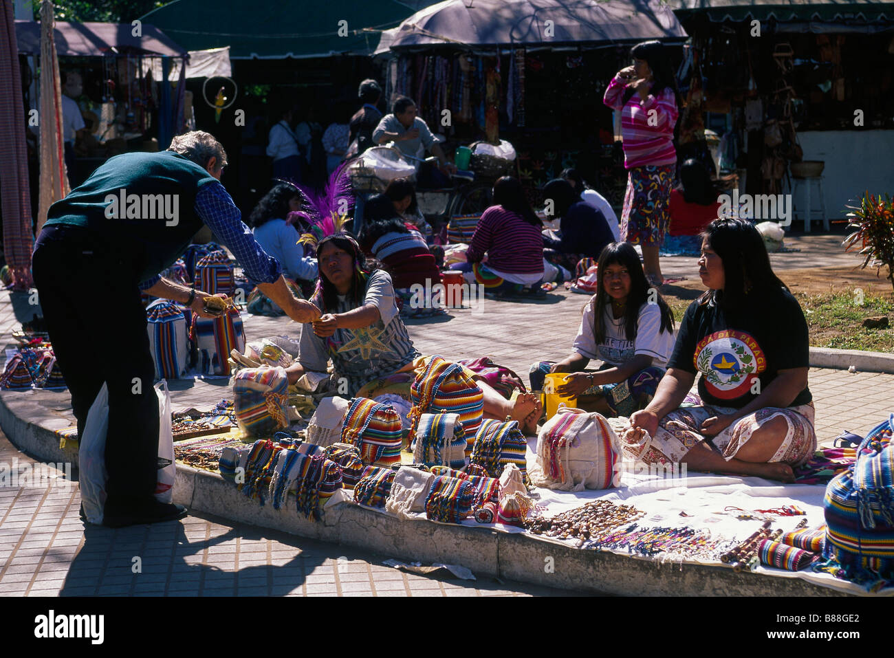 Native South American Indian people selling traditional craft ware ...