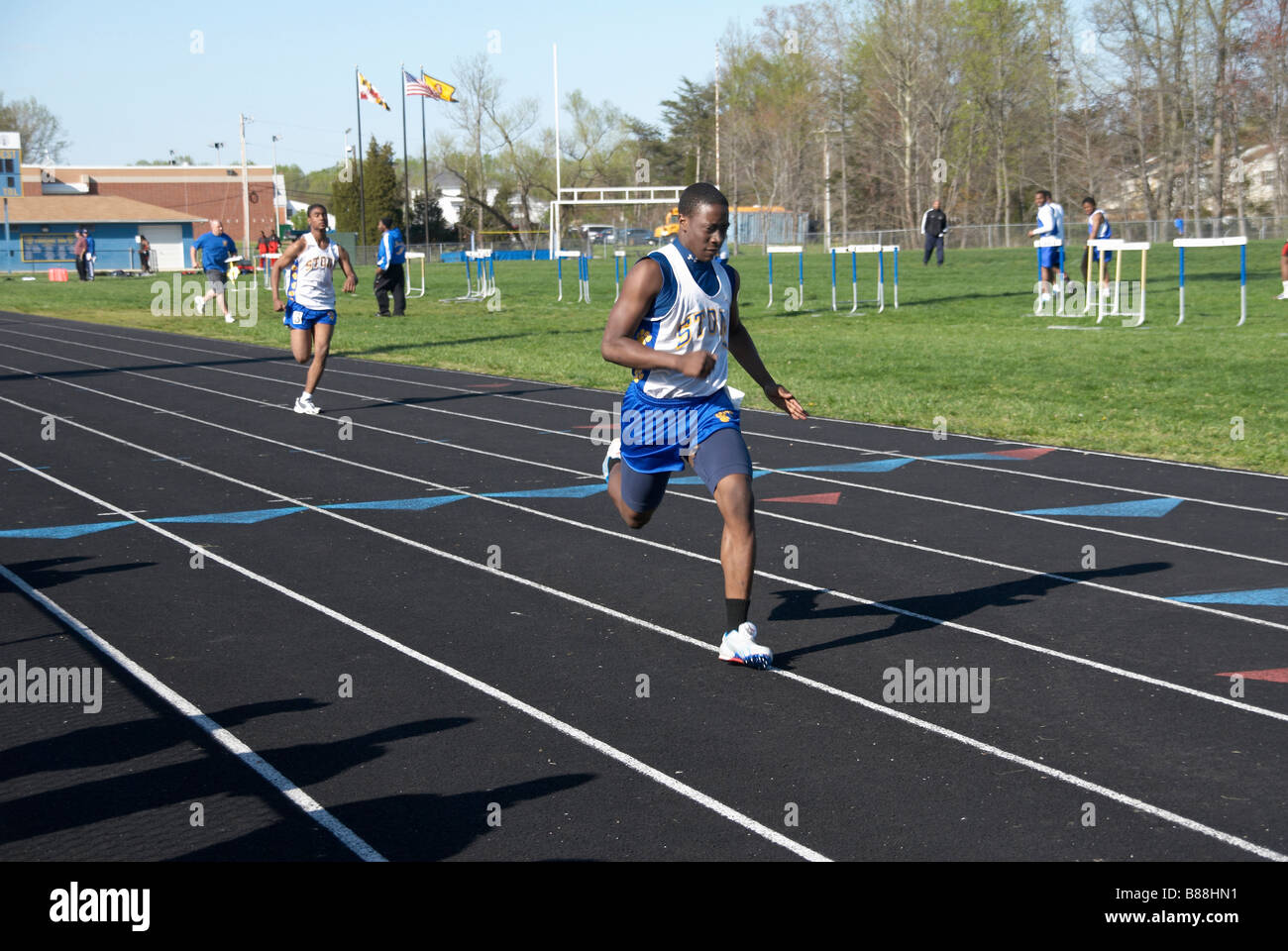 Teen player in a track meet Stock Photo - Alamy