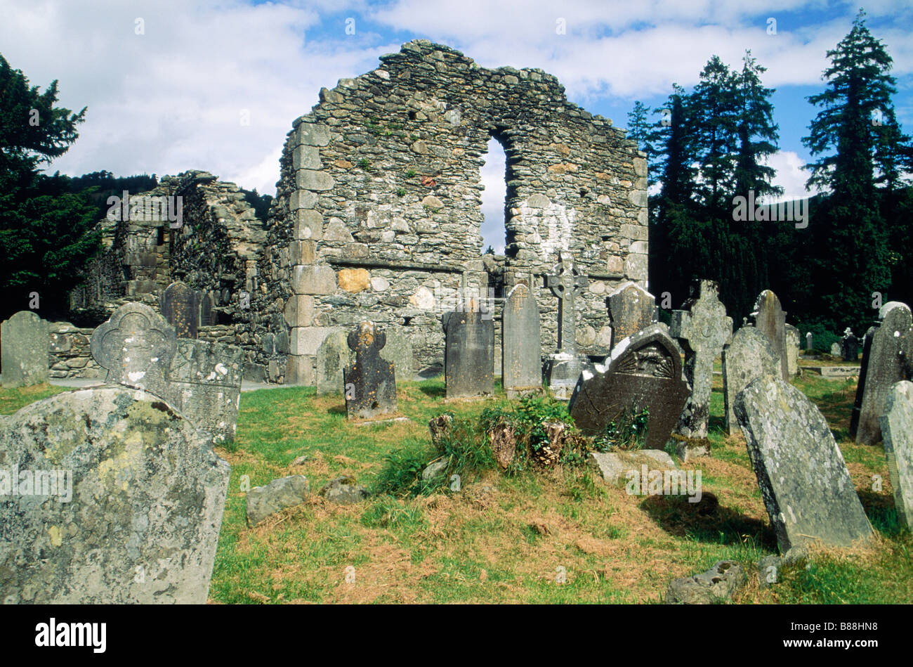 Ruins of cathedral church Stone walls Arch Graveyard stones Carved ...