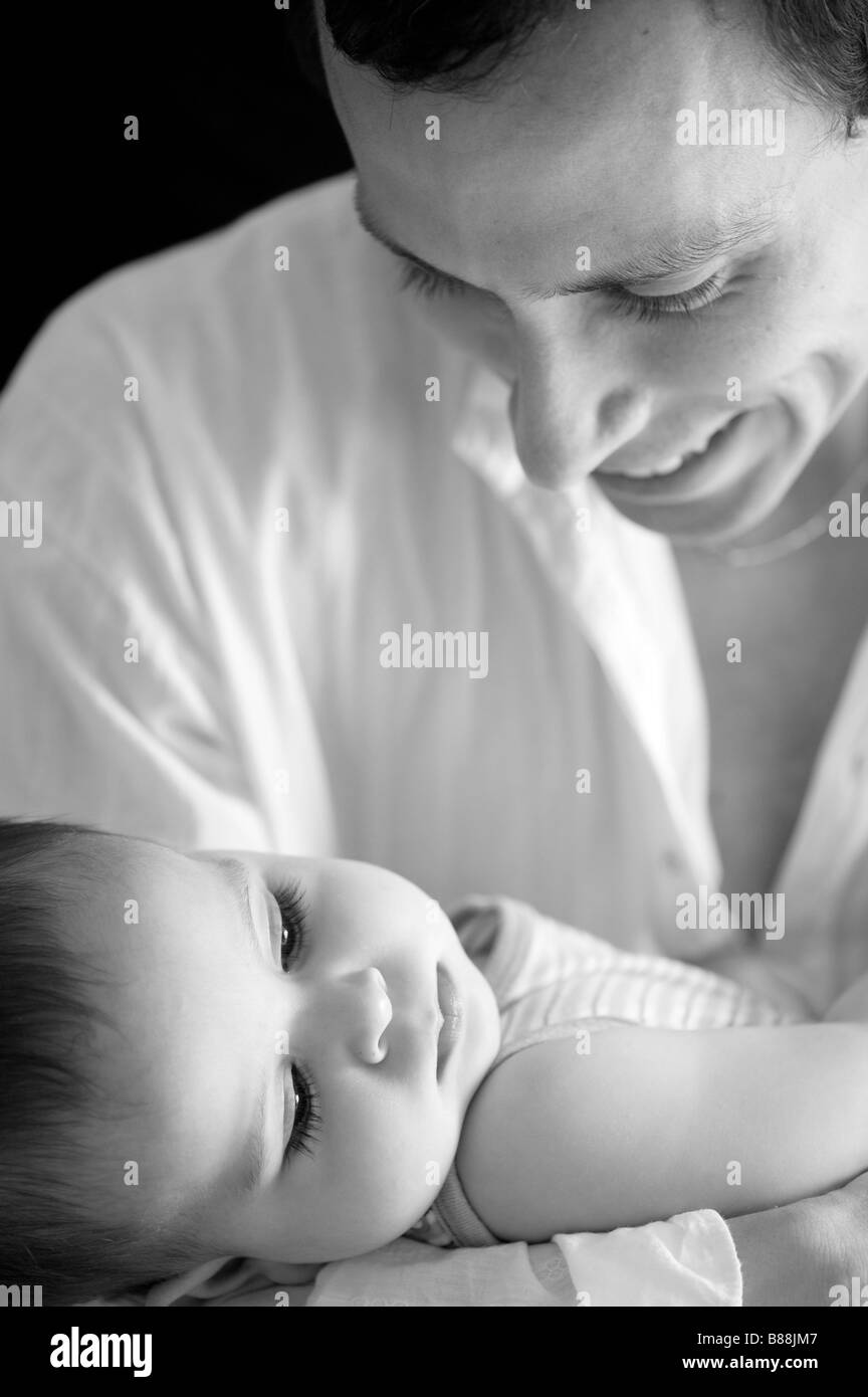 Loving father and baby boy. Black and White Stock Photo - Alamy