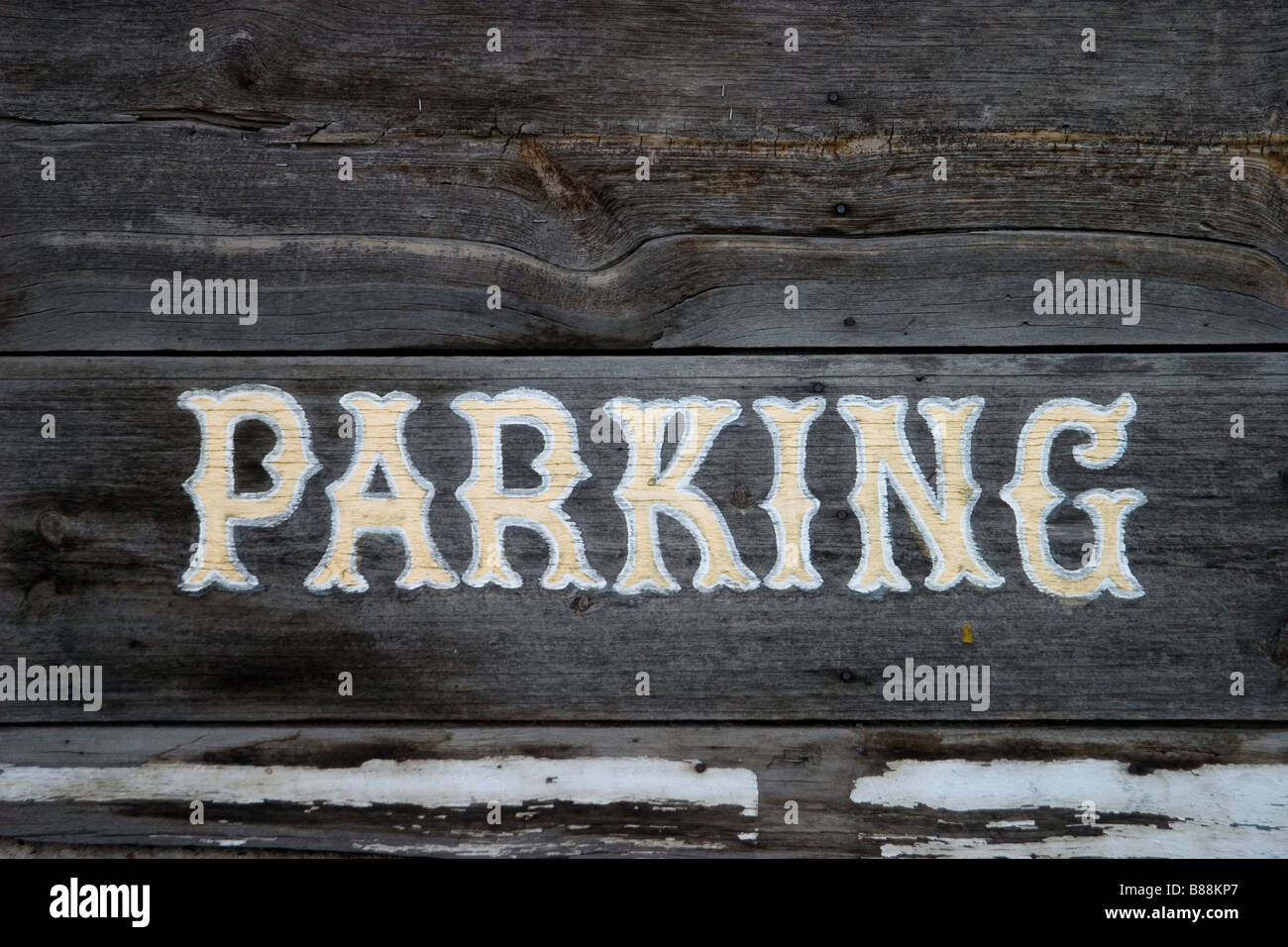 Parking sign in old west style typeface Stock Photo - Alamy