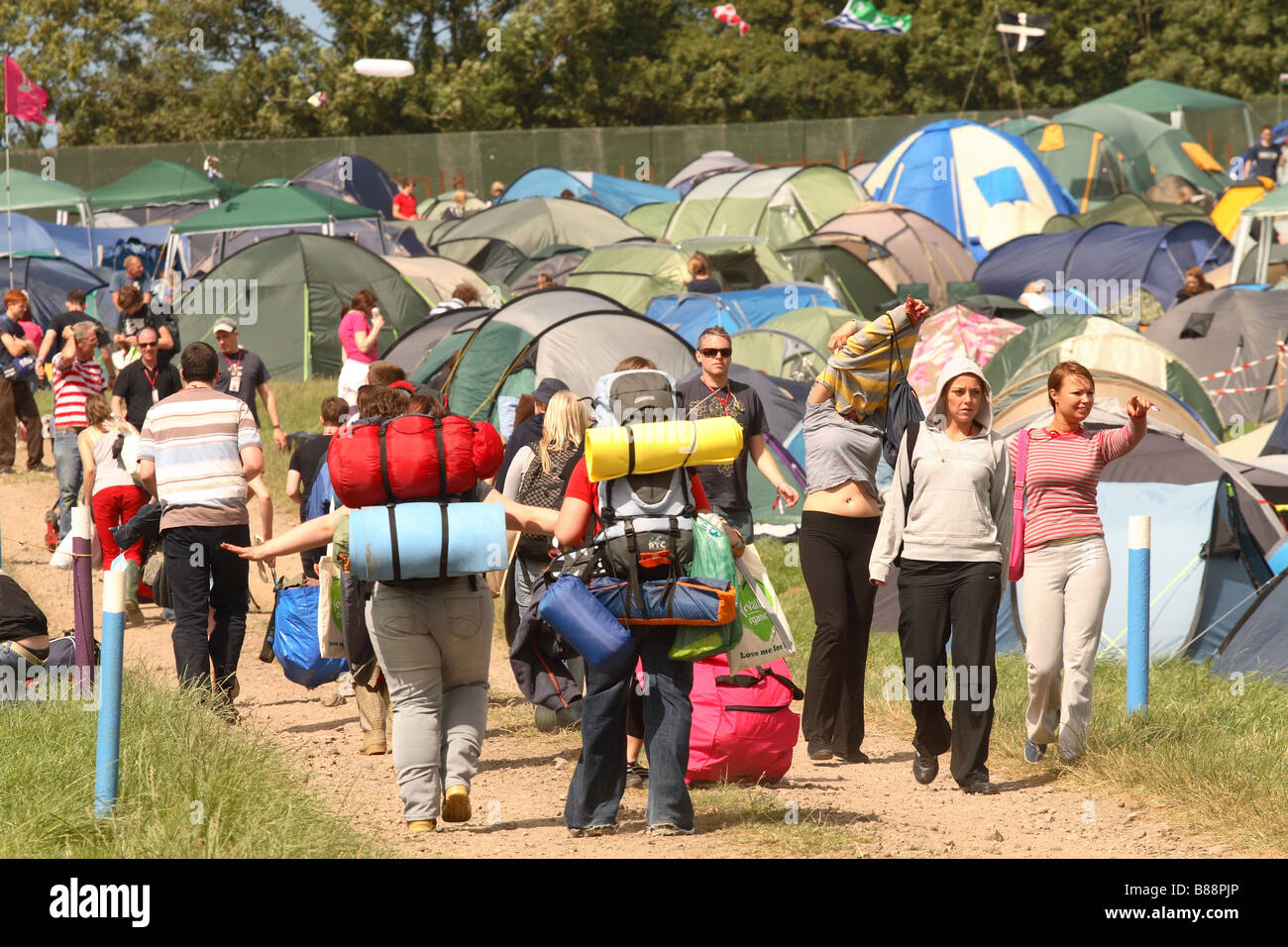 Glastonbury Festival Fans And Festival Goers Arrive With Backpacks