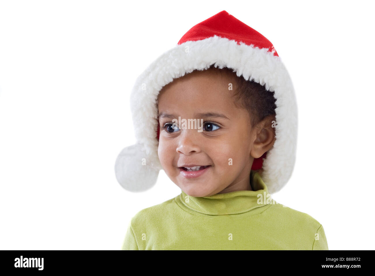 African baby girl with red hat of Christmas on a over white background ...
