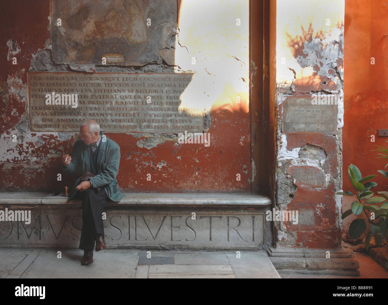 Man smoking outside a church in Rome Italy Stock Photo - Alamy