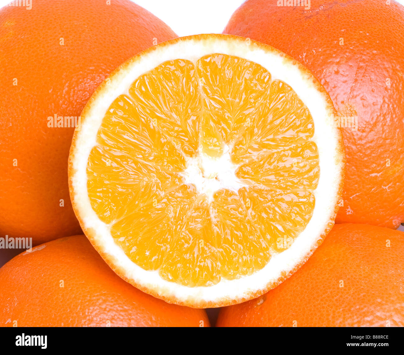 Many oranges on a over white background Stock Photo - Alamy