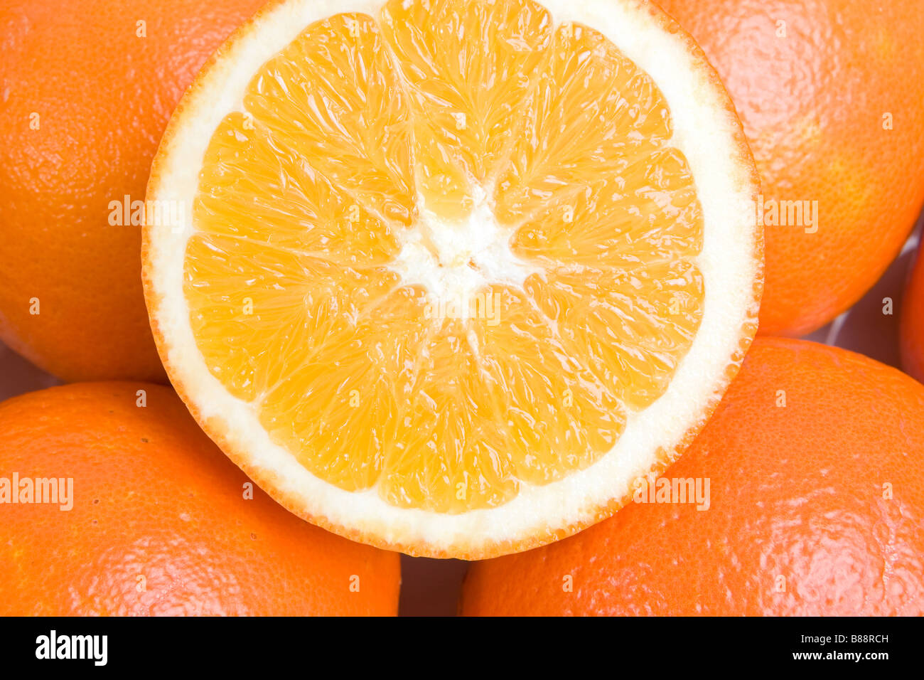 Juicy fruit heading with many oranges background Stock Photo - Alamy
