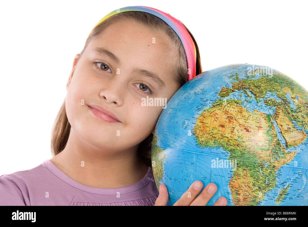 Adorable girl with a globe of the world over white background Stock ...