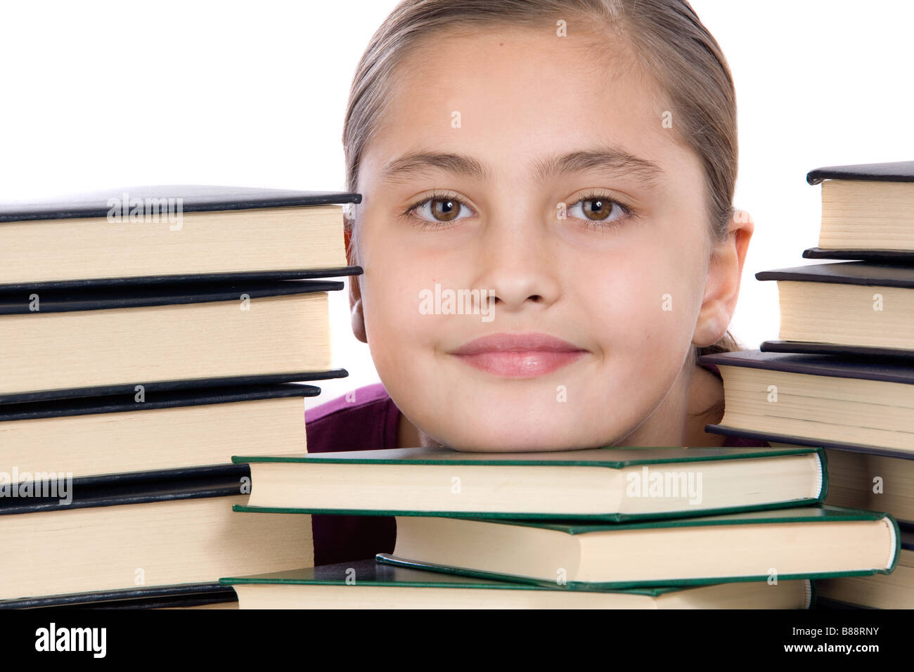 Adorable girl with many books on a over white background Stock Photo ...