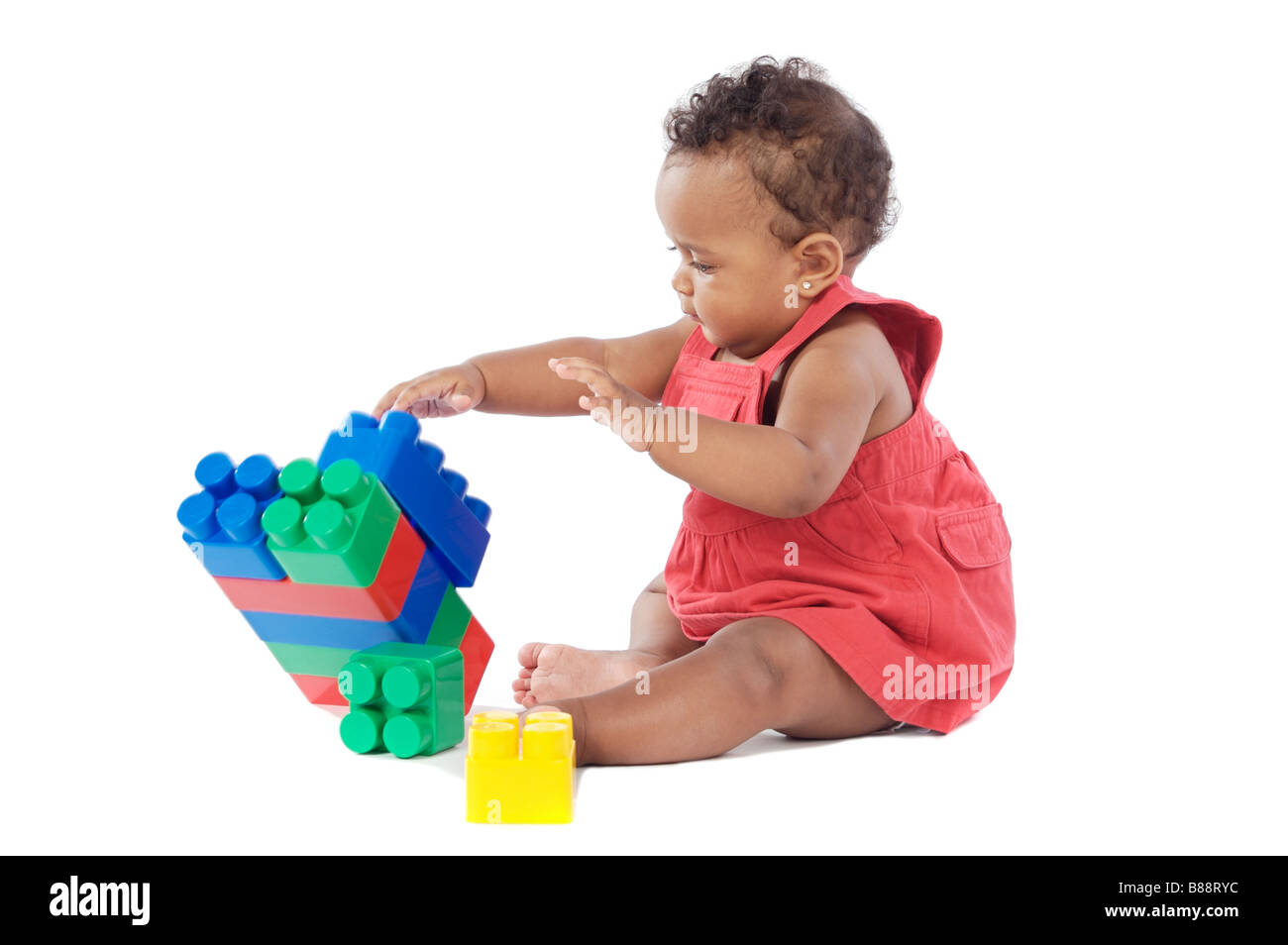 Adorable baby girl playing with building blocks Stock Photo - Alamy