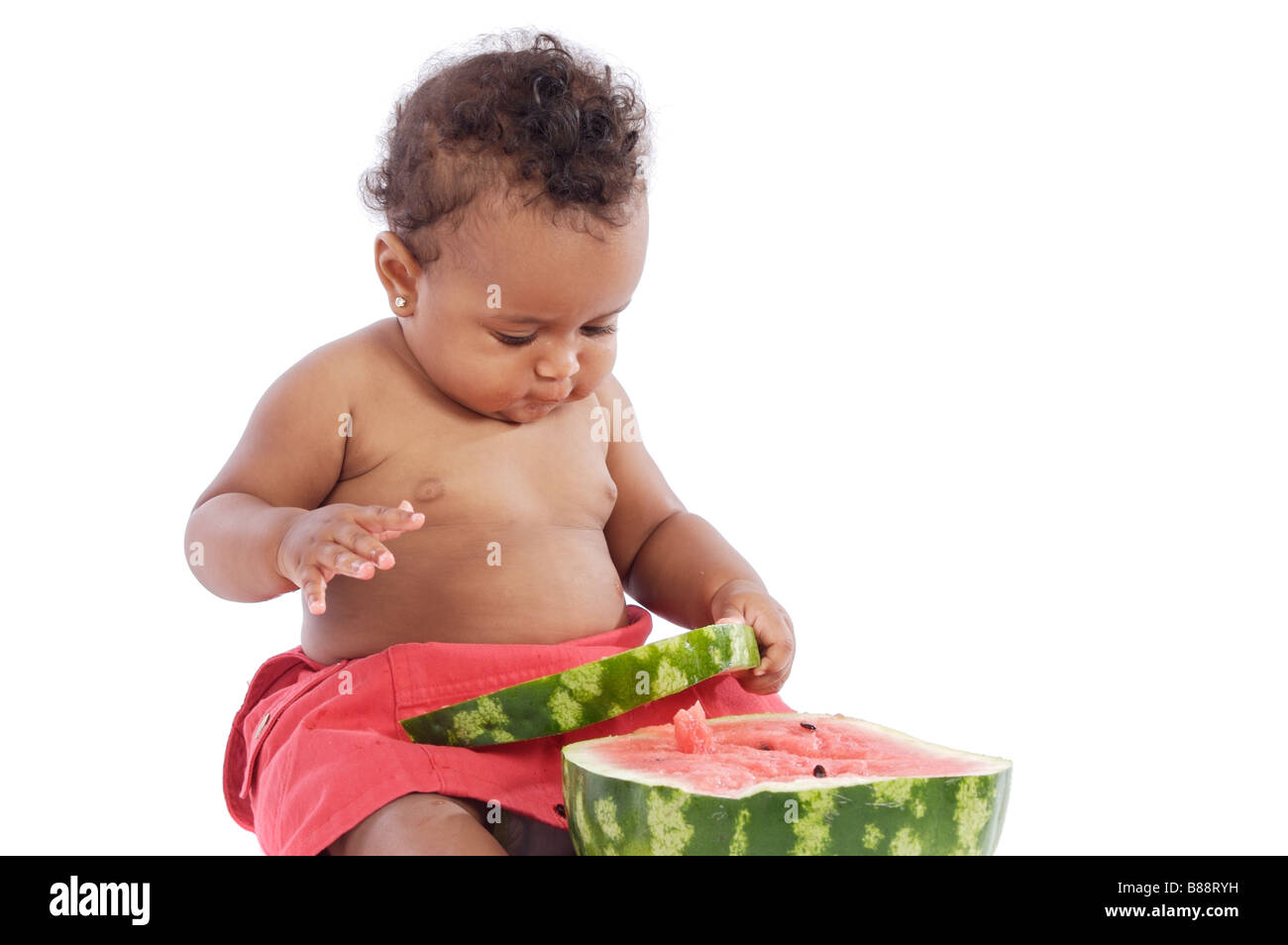 adorable baby eating watermelon a over white background Stock Photo - Alamy