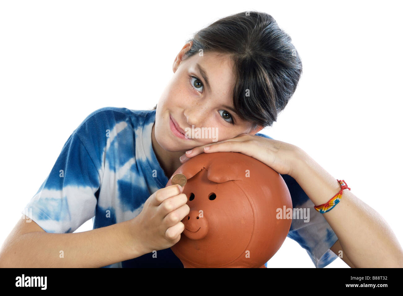 adorable girl whit money box a over white background Stock Photo - Alamy