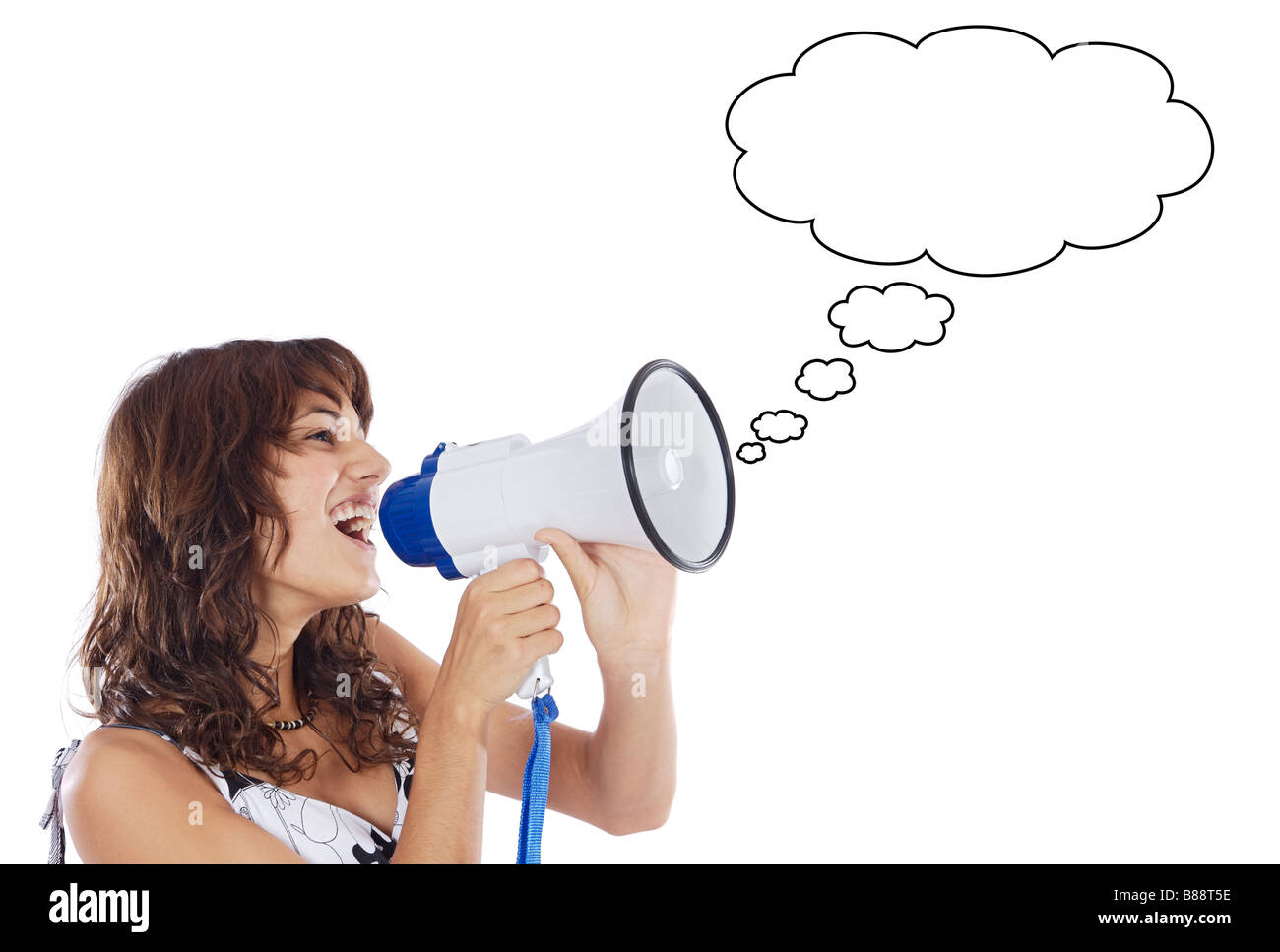 Teenager speaking through a megaphone over white background Stock Photo ...