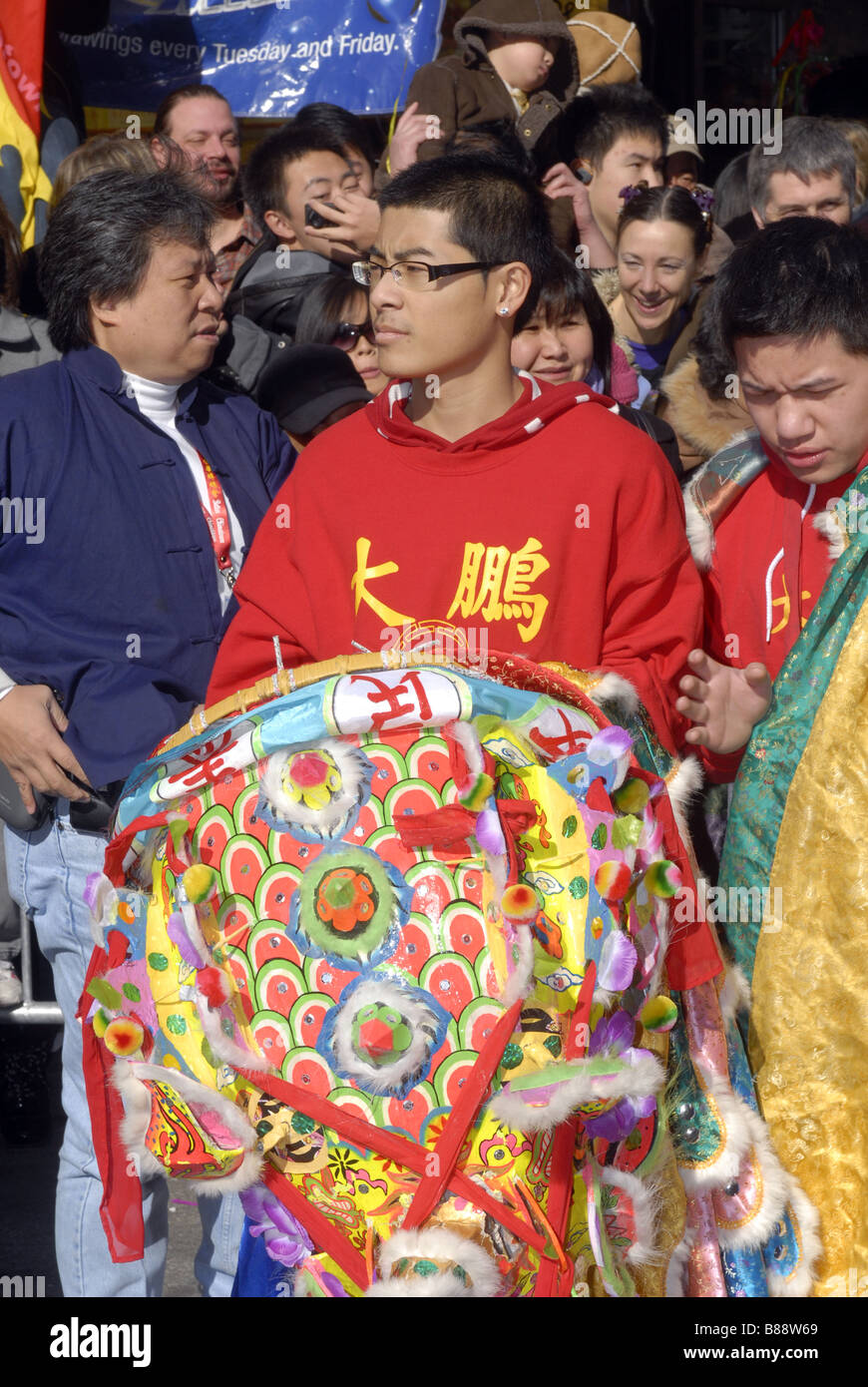 A dragon dancing troupe waits to perform in Chinatown during the annual ...