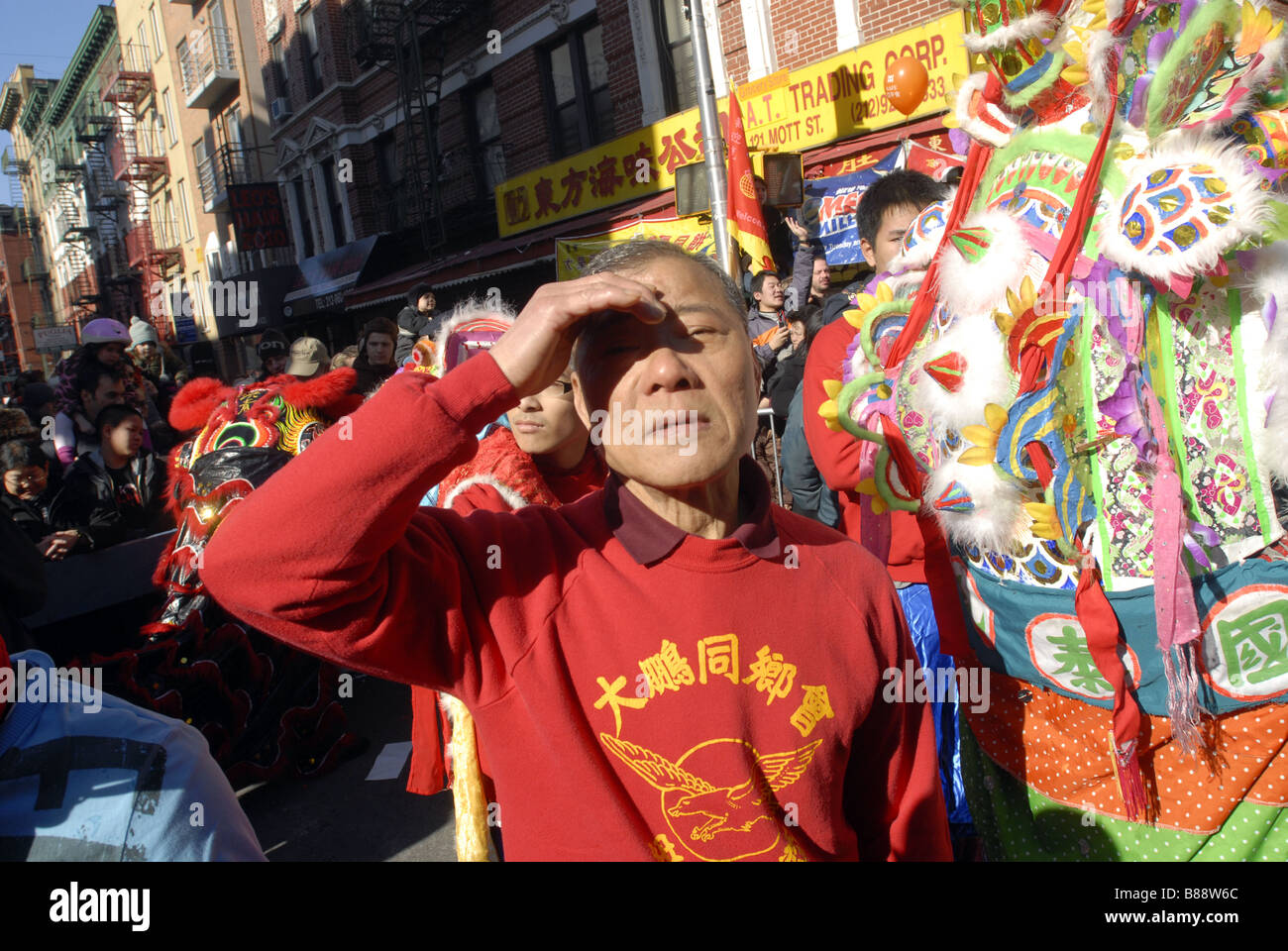 A dragon dancing troupe waits to perform in Chinatown during the annual ...