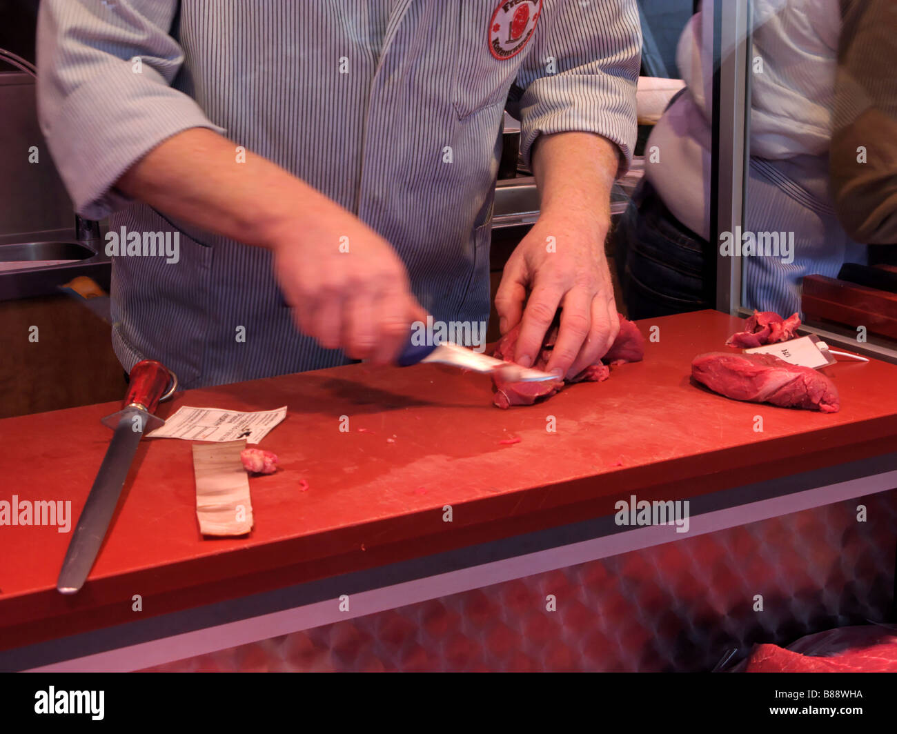 Butcher Cutting Steak Stock Photo - Alamy
